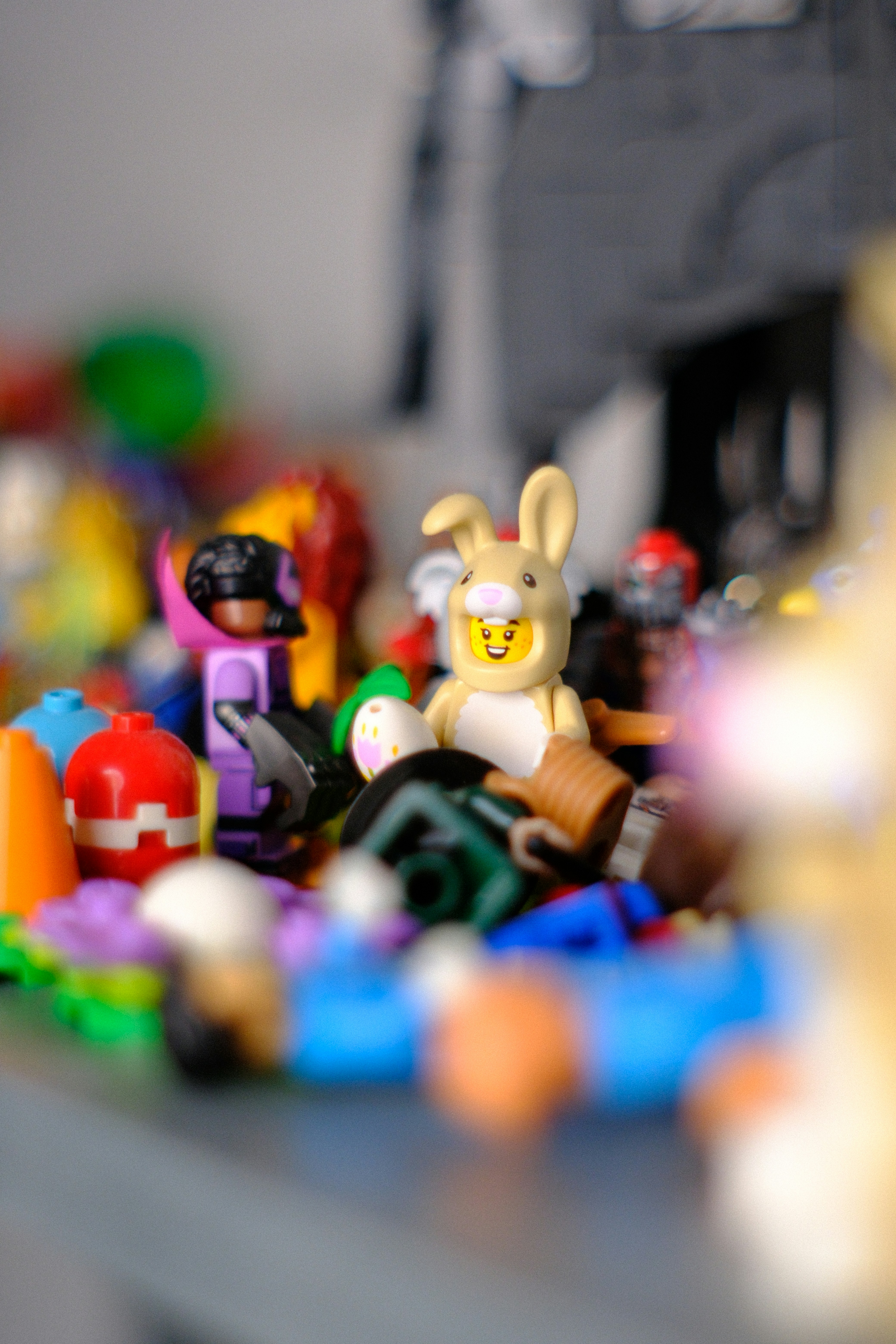  Bunny-Suited Toy Amid a Colorful Clutter of Tiny Figures