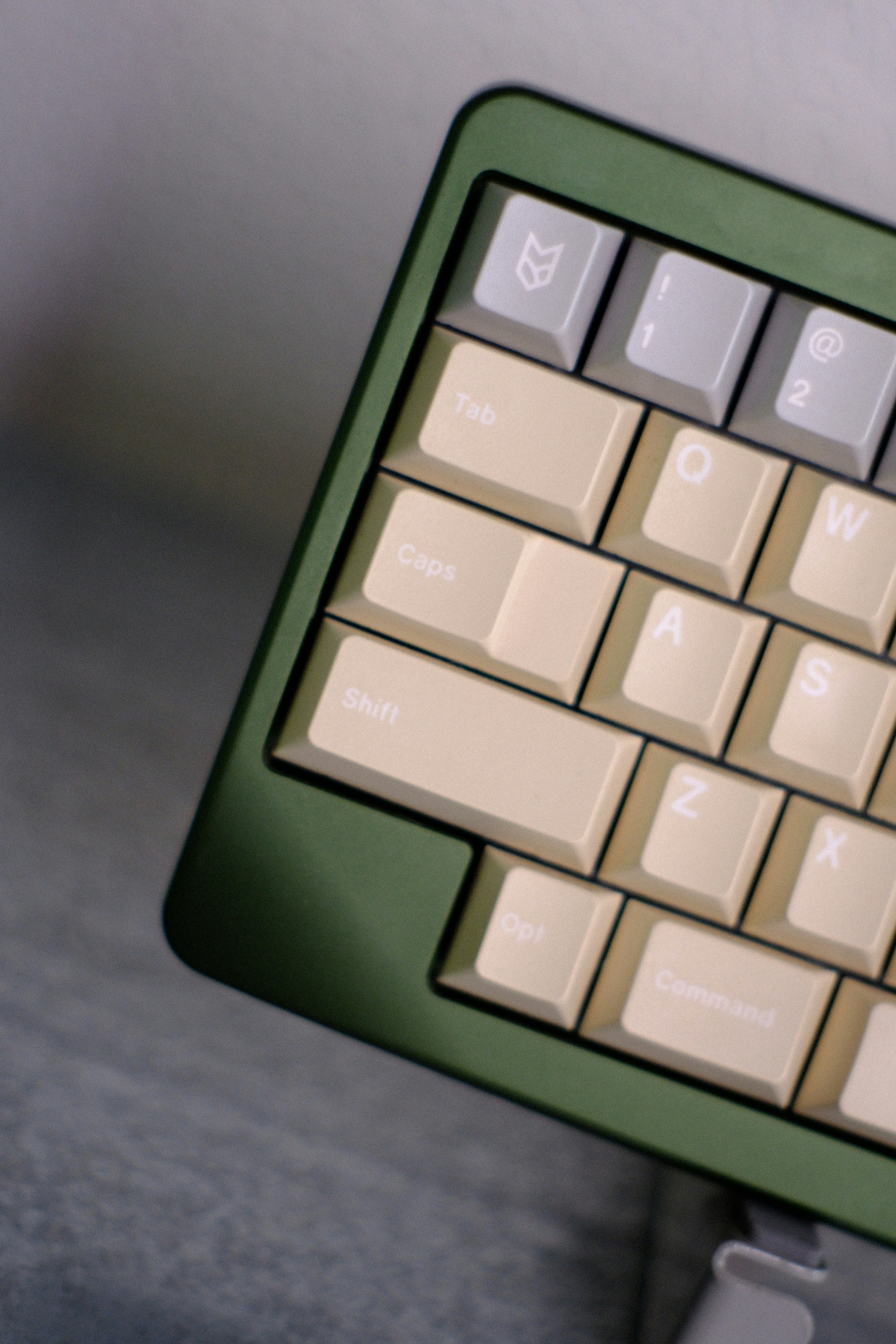 Green Keyboard corners: a close-up study in beige keys