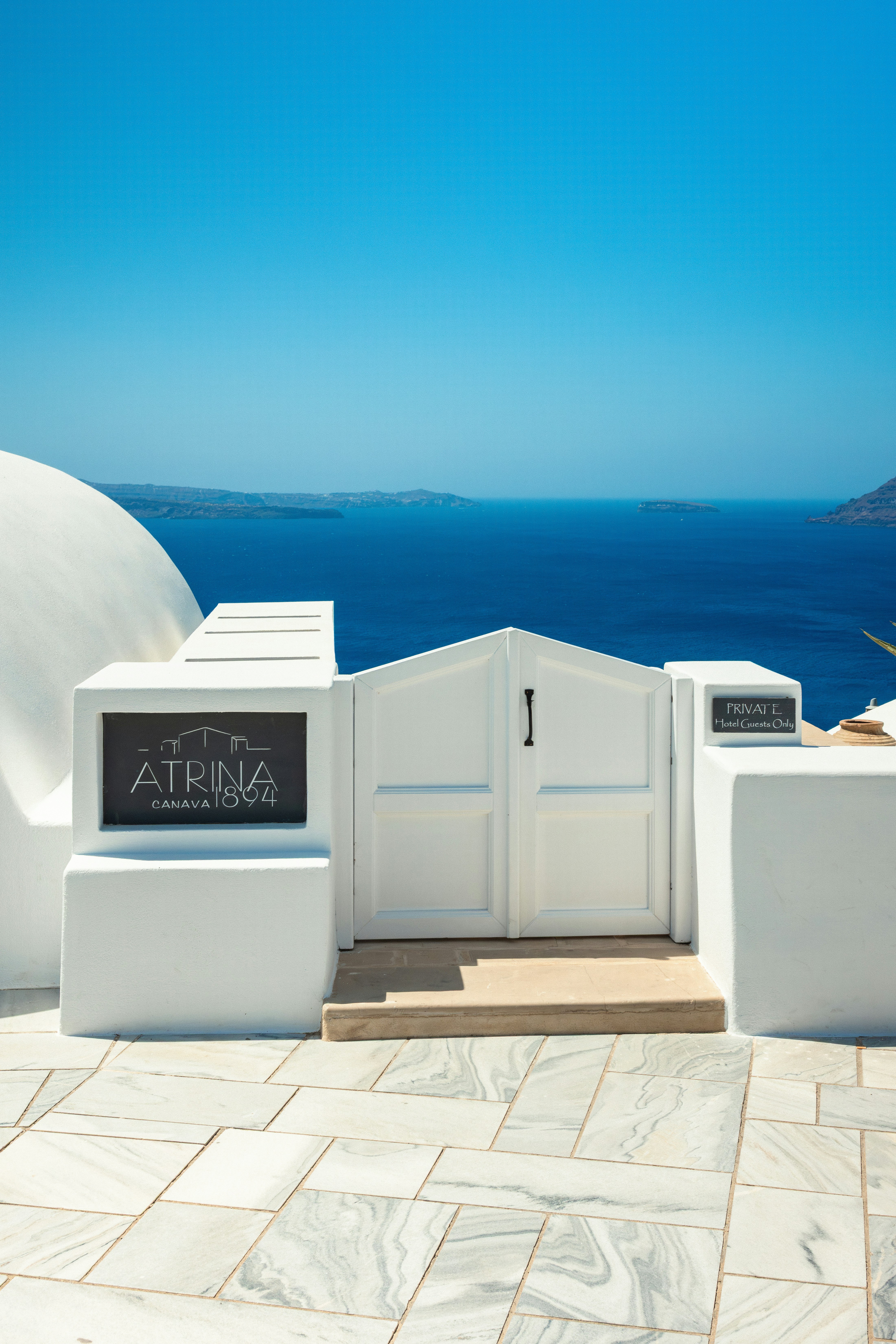 Whitewashed Terrace Overlooking Aegean Blues