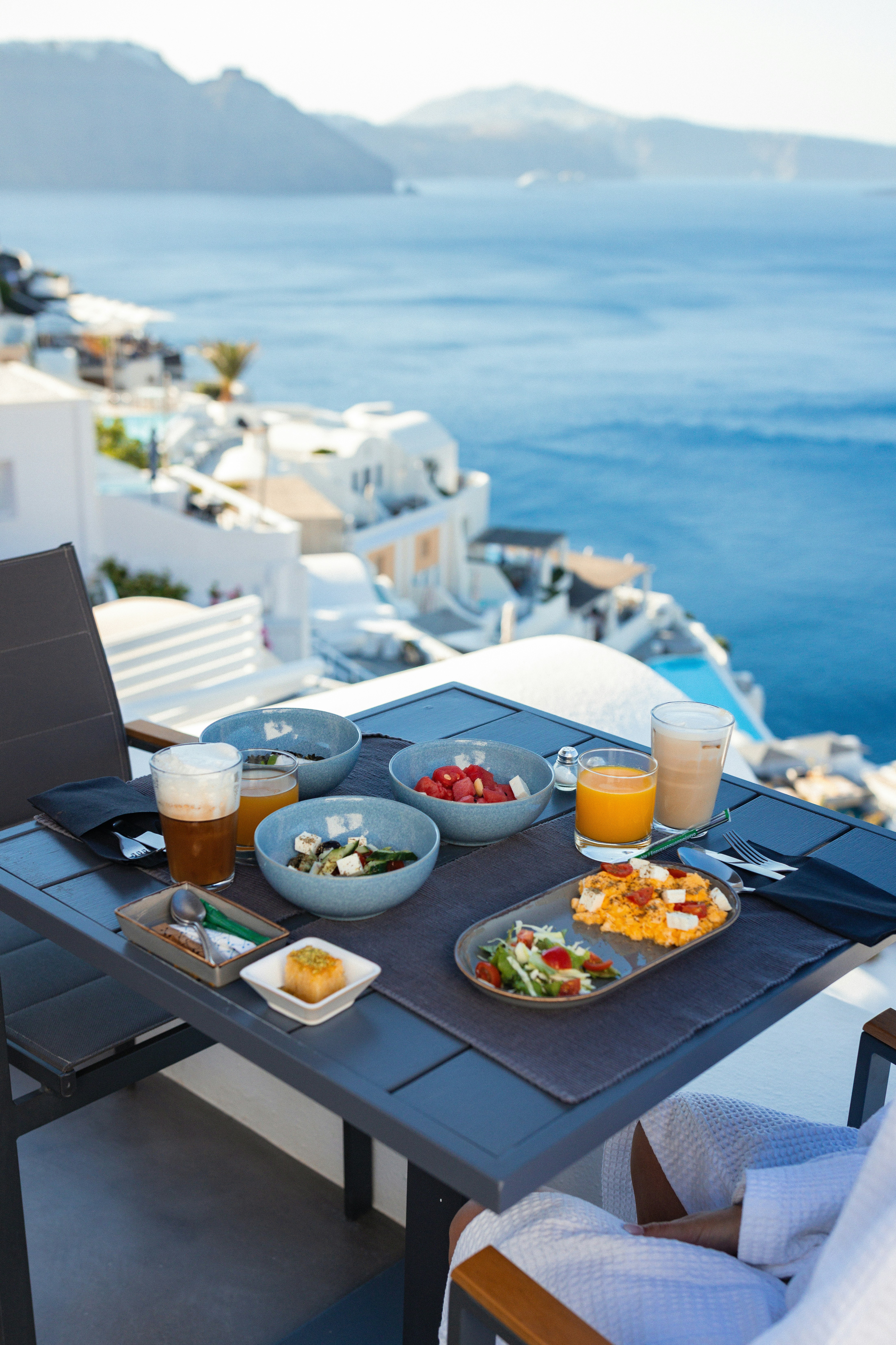 Seaview Terrace: A Sunlit Table with Atlantic Blue Beyond