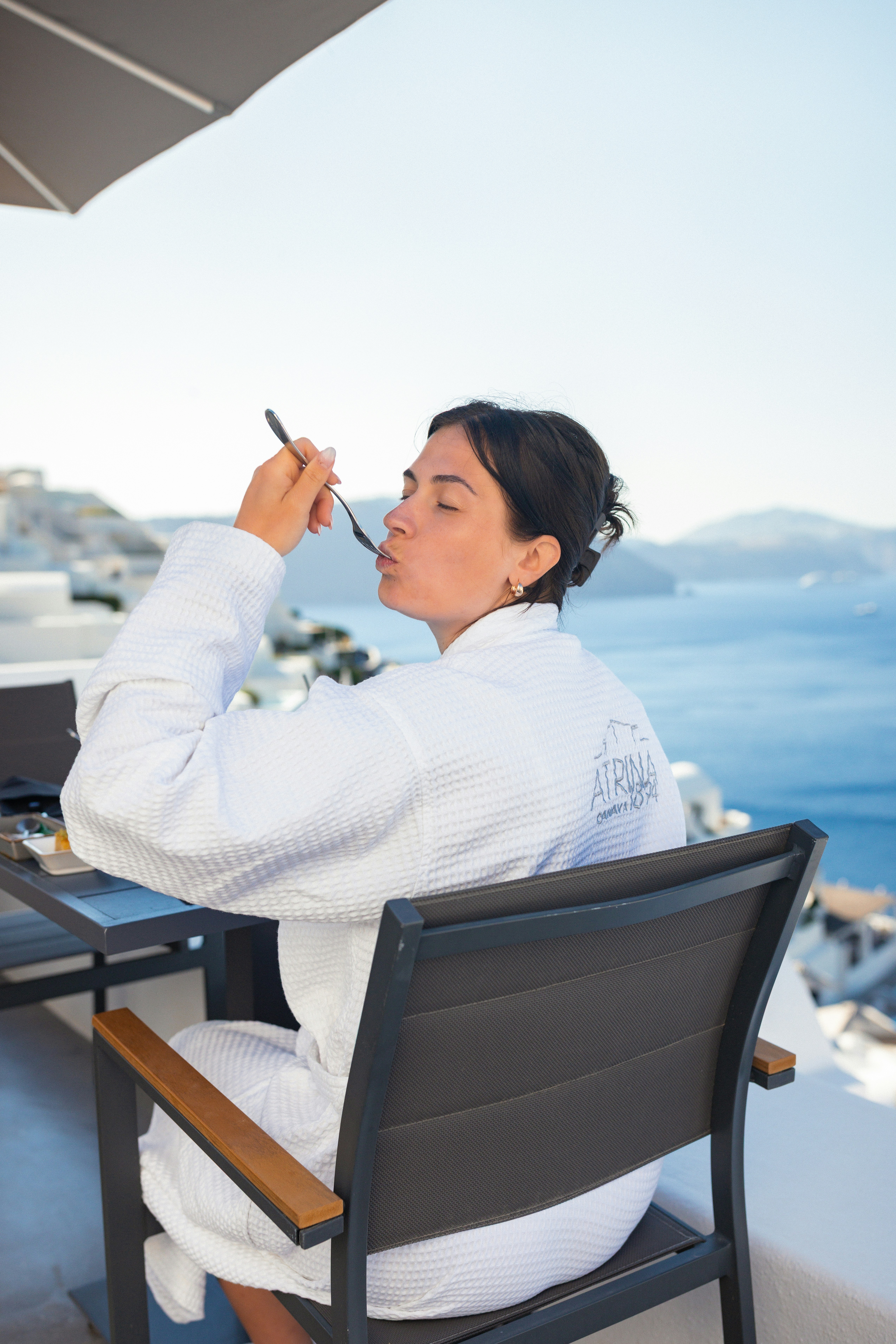Sunlit Indulgence: A Quiet Moment on the Balcony