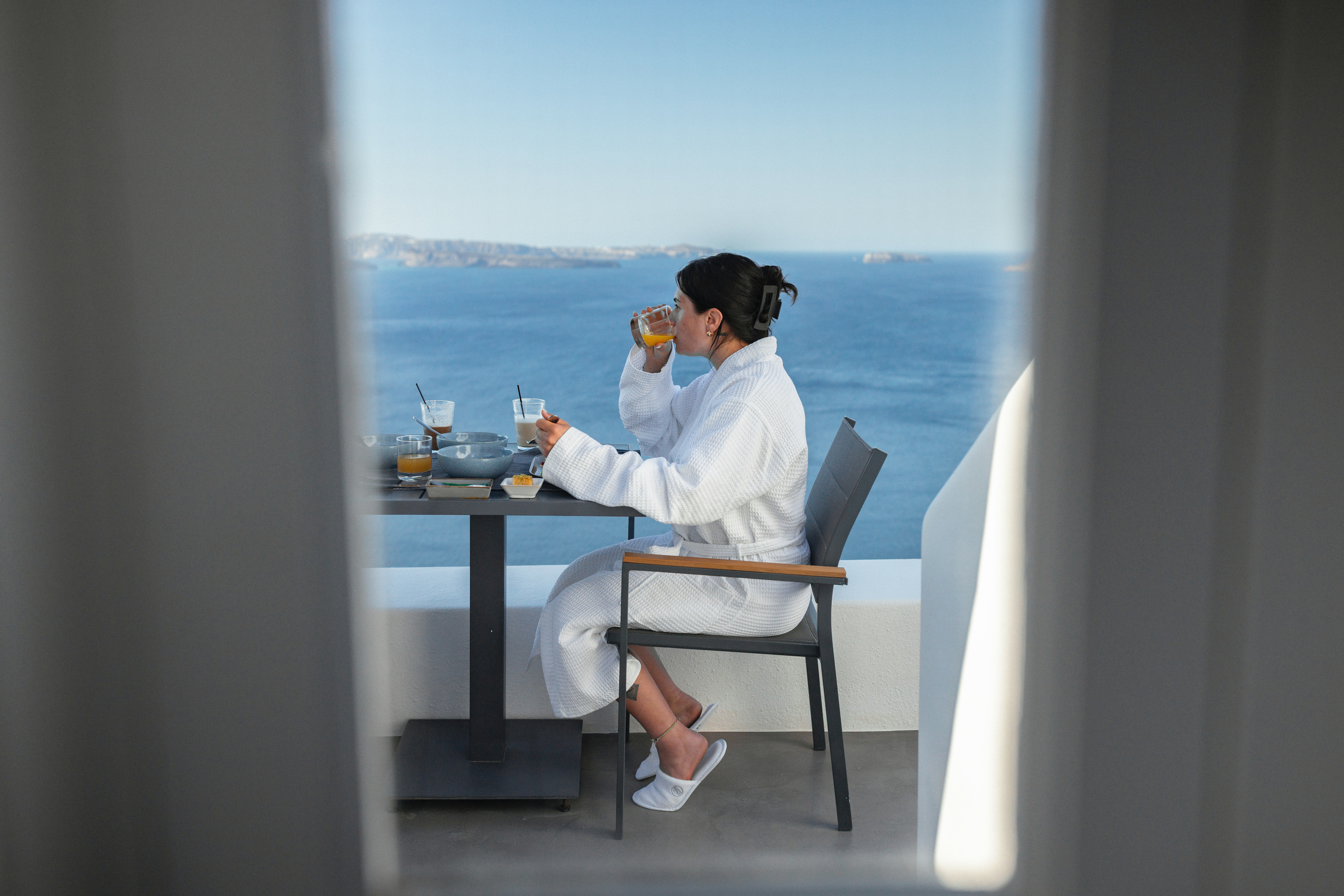 Spa-side toast: sipping warmth with ocean views