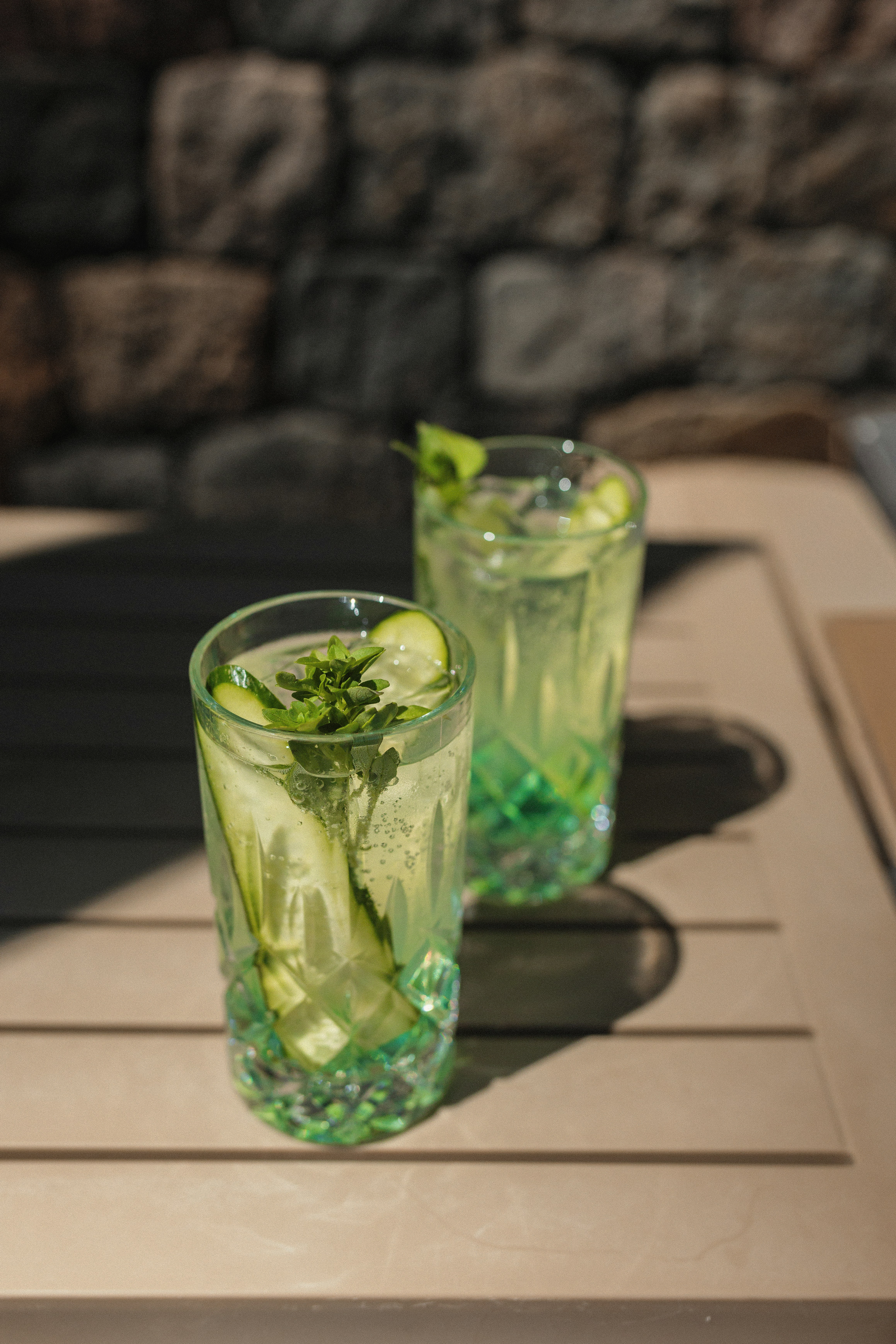 Green Mint Moments: Two Highball Glasses in Soft Sunlit Ambience