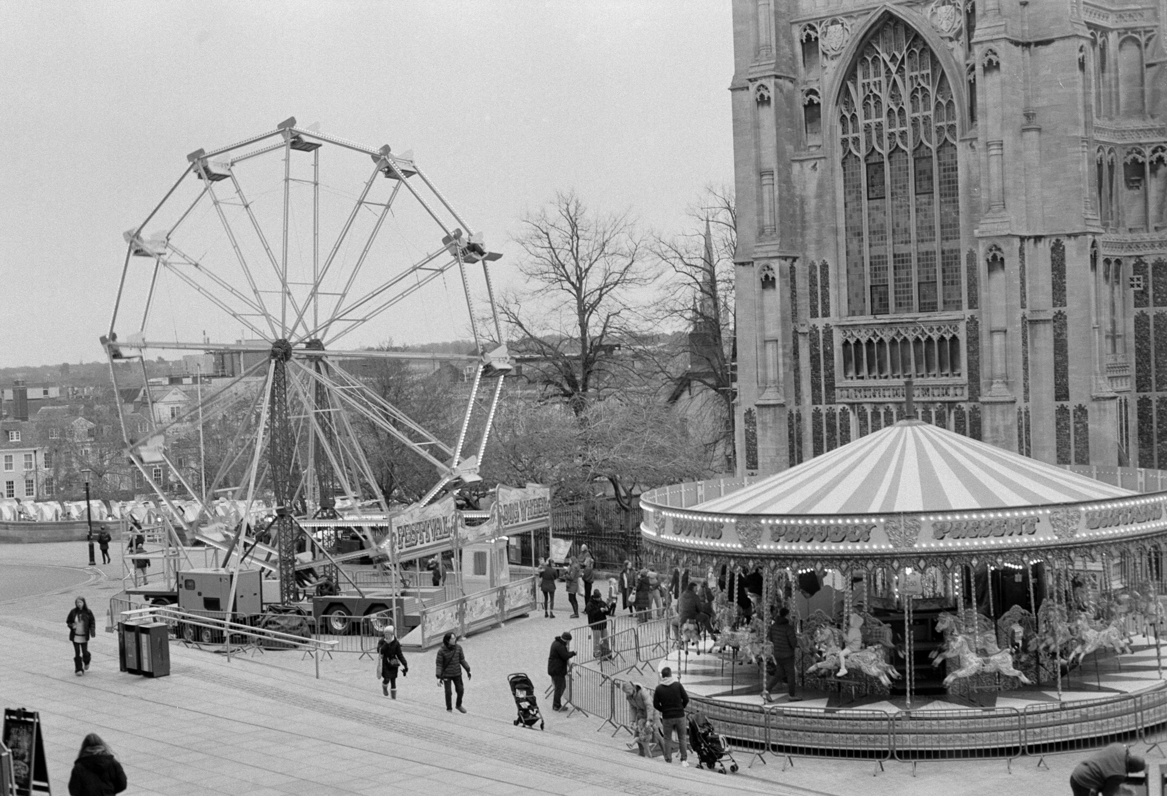 Carousel Ring and Cathedral Spire: A Winter Fairground by the Cathedral