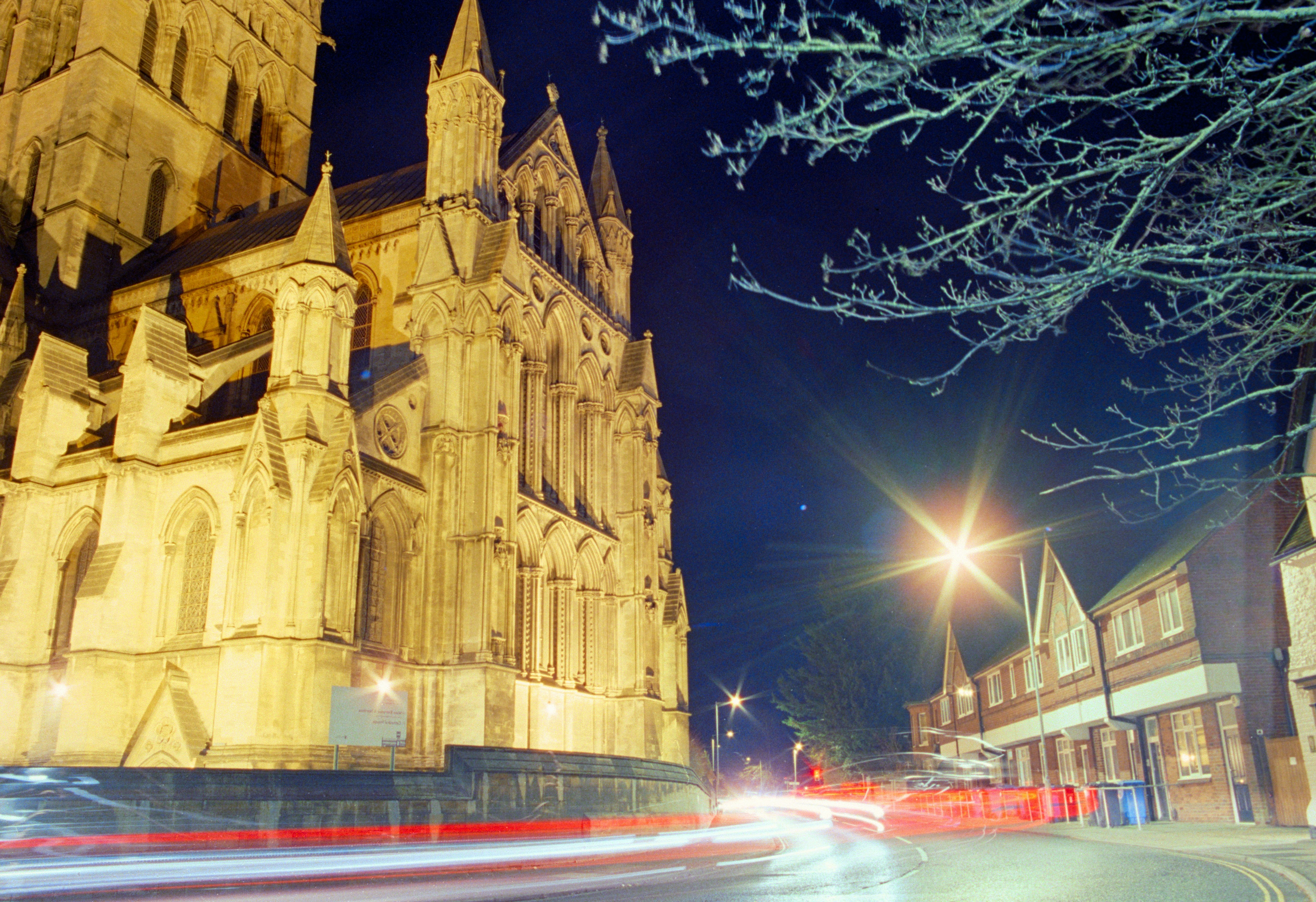 Gothic Cathedral by Nightfall: A Carved Pause in a Lively High Street