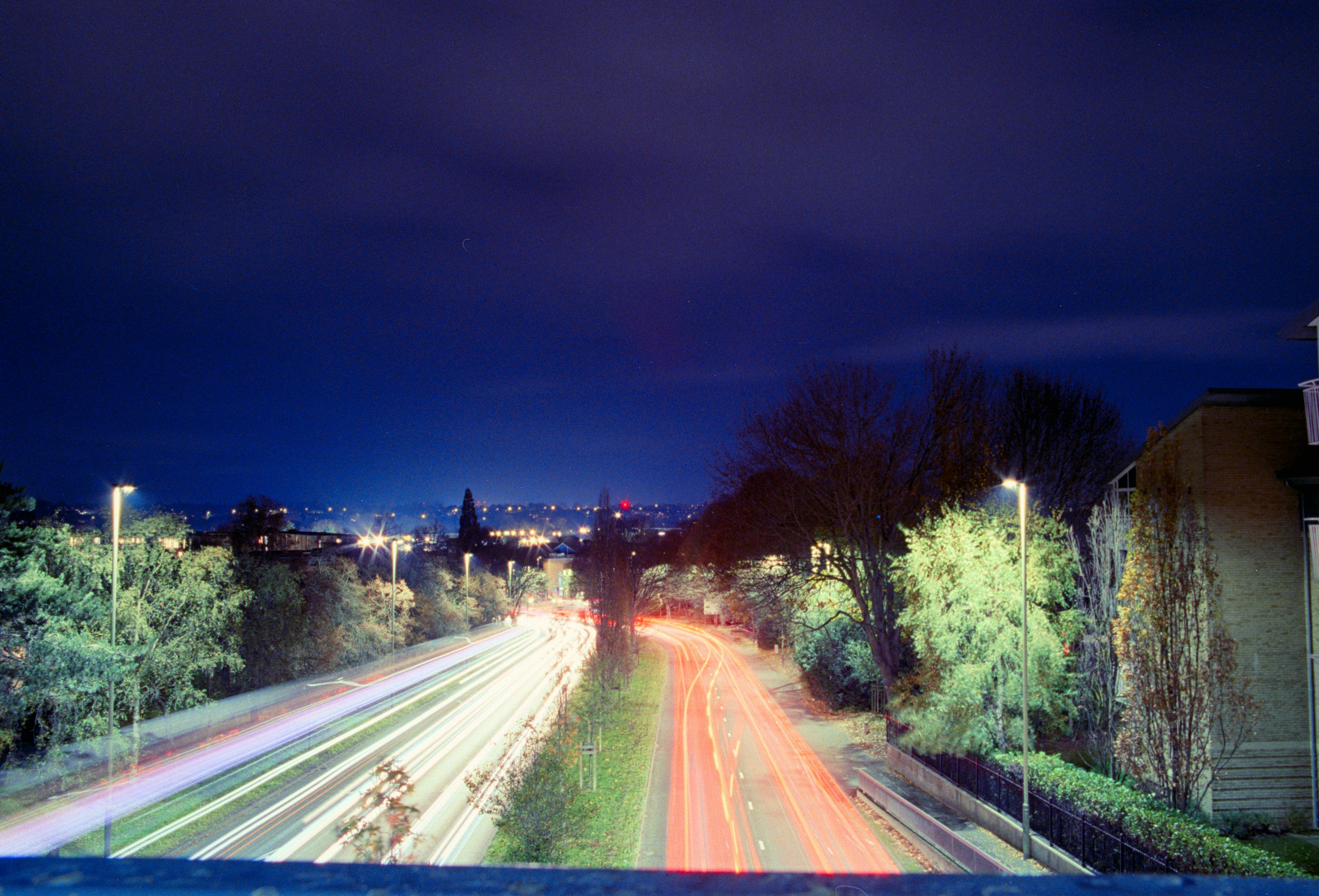 Night Rush: Light Trails Over a Quiet Urban Corridor