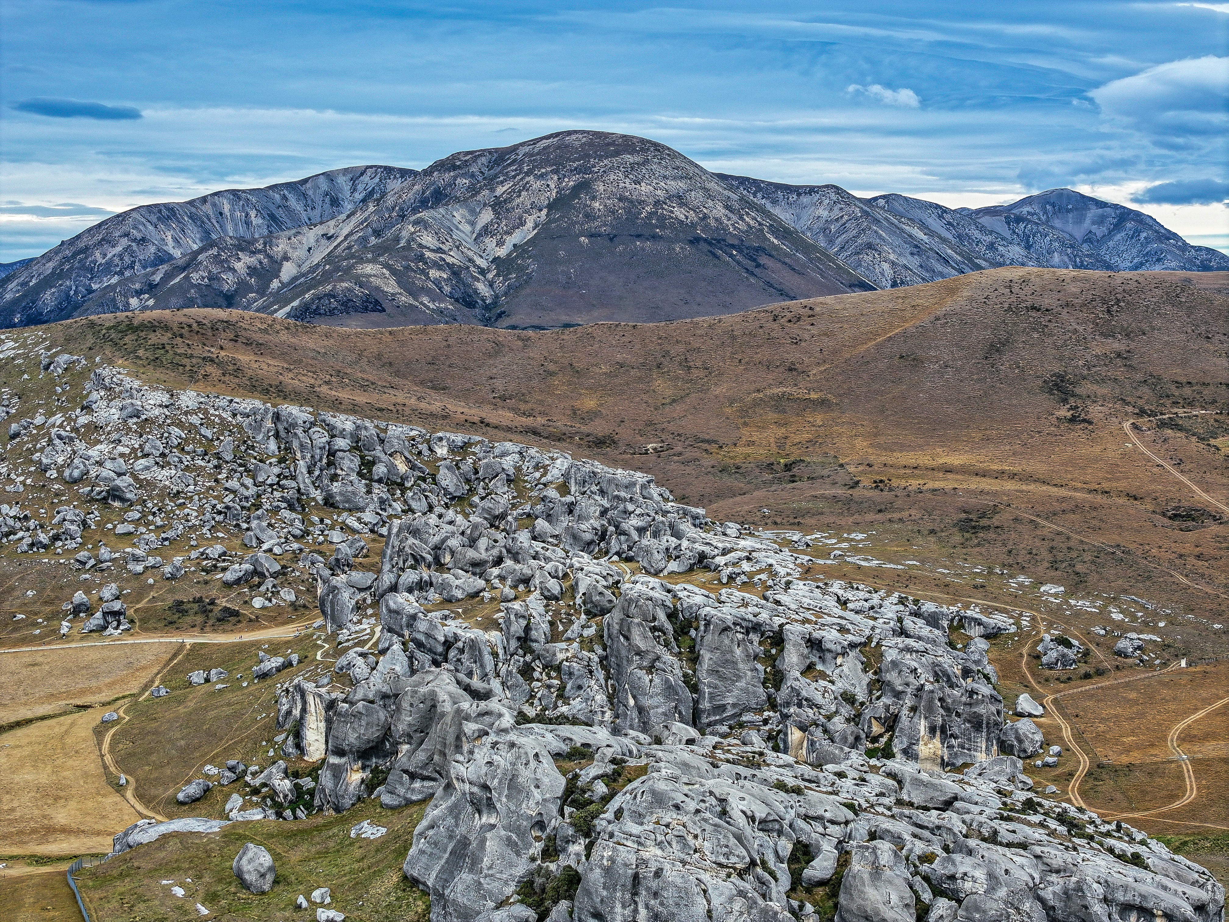 Stone Whisperers: A Plateau of Granite Behind Rolling Moor