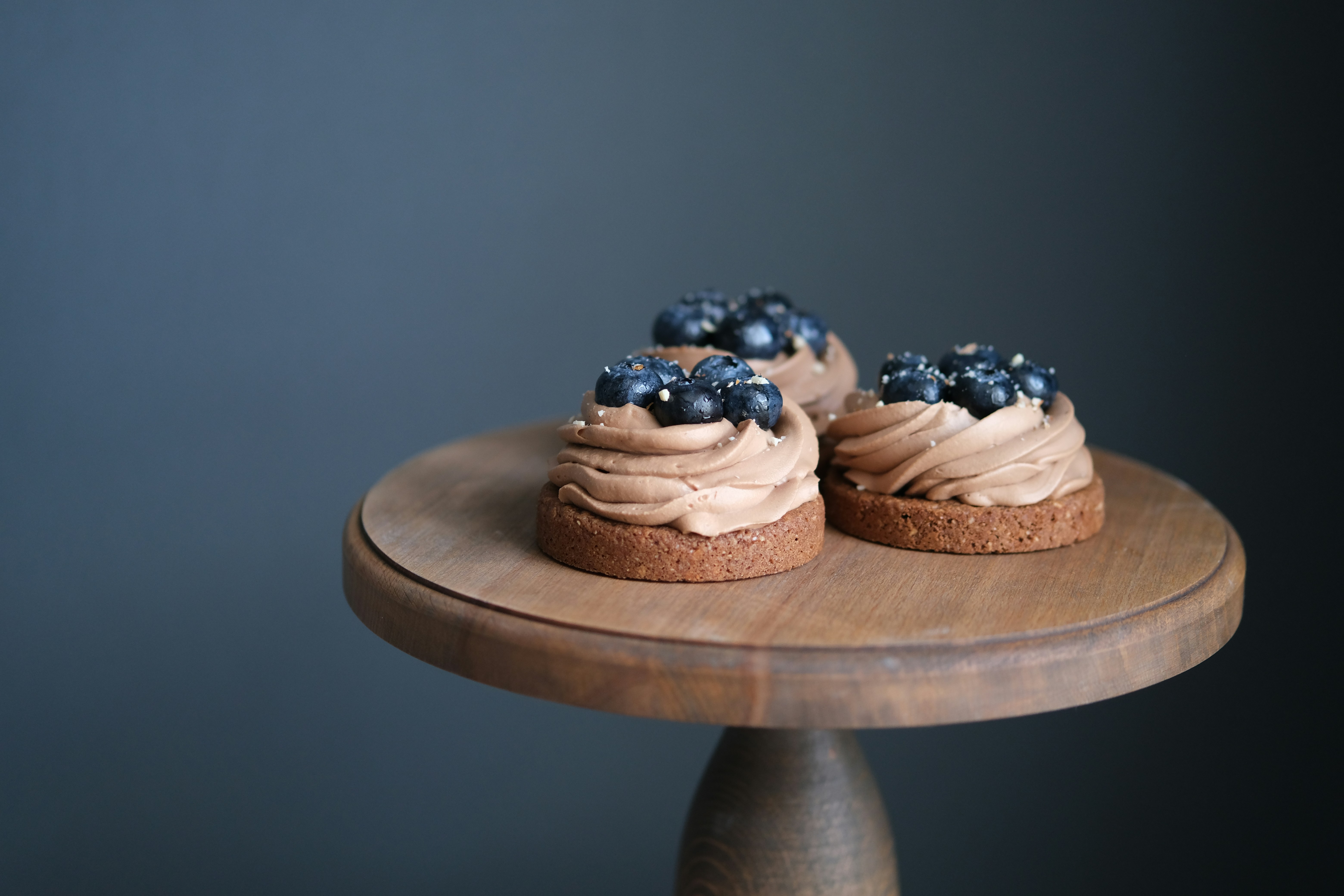 Velvet Berry Nibbles on a Quiet Wooden Stage