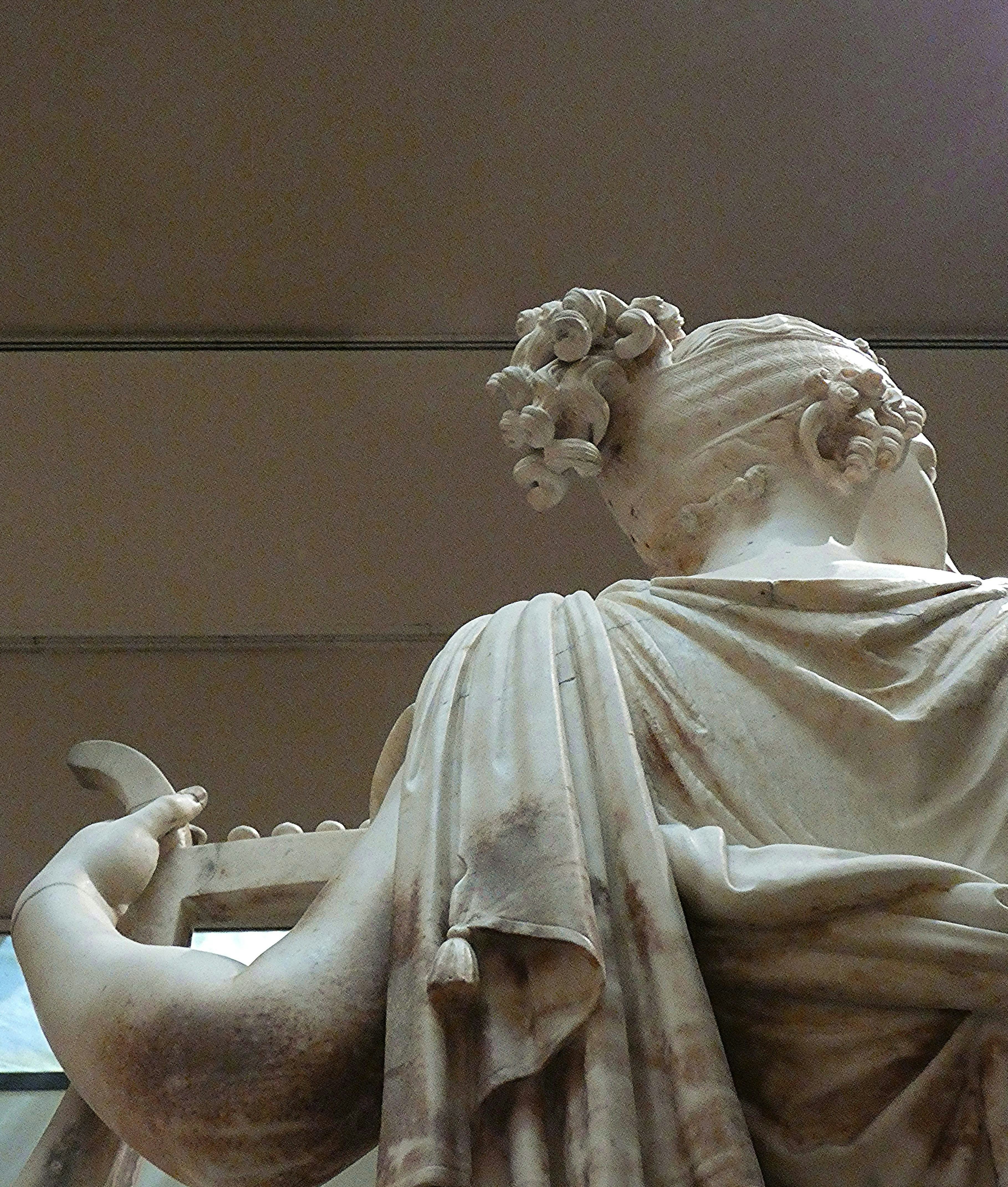 Marble Reverie: The Back View of a Classical Goddess