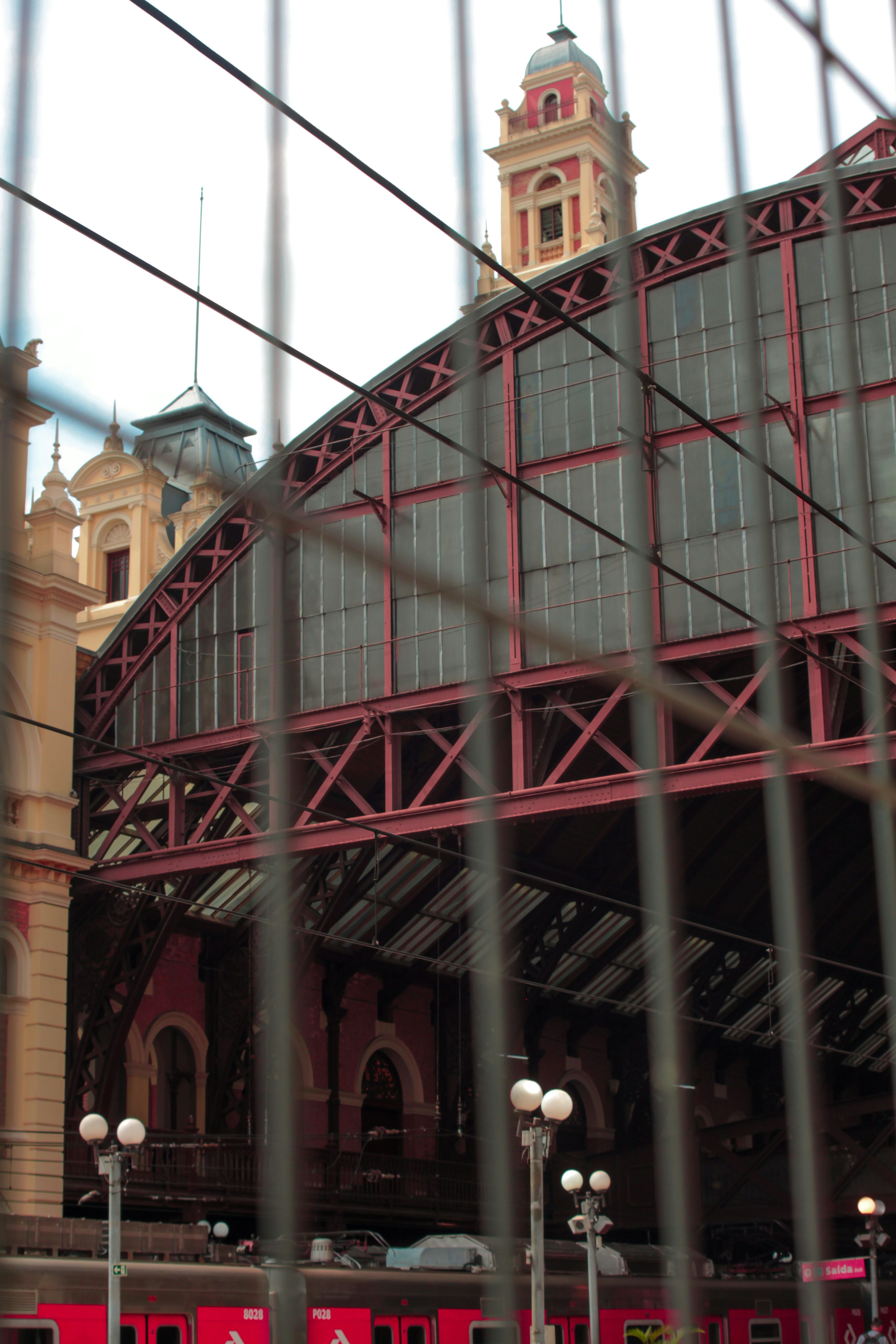 Crisscrossed Steel and Stained Glass: A Train Station Facade Through Wires