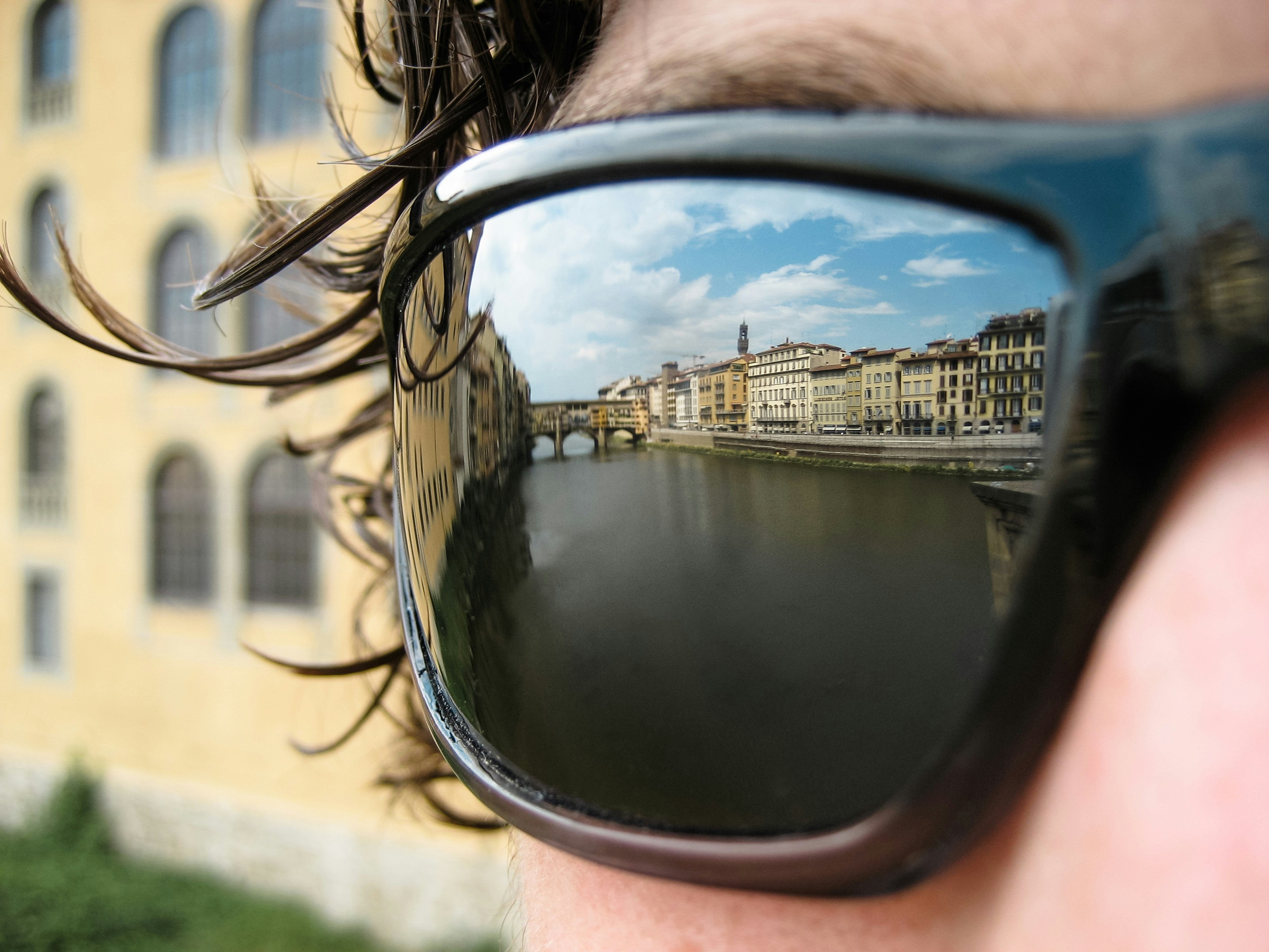 Reflected City: A Glimpse Through Sunglasses