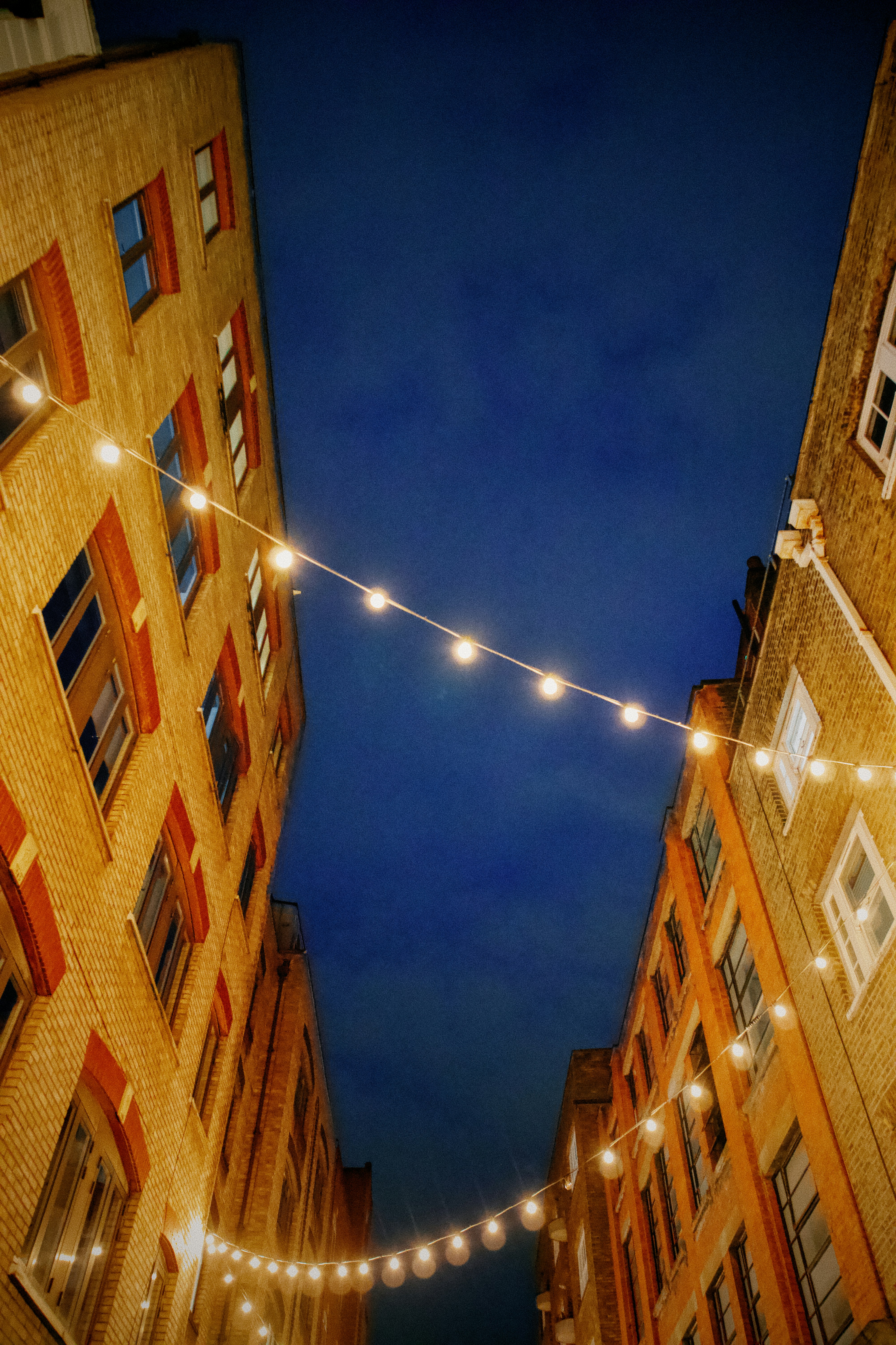String of Glimmer over City Walls at Dusk