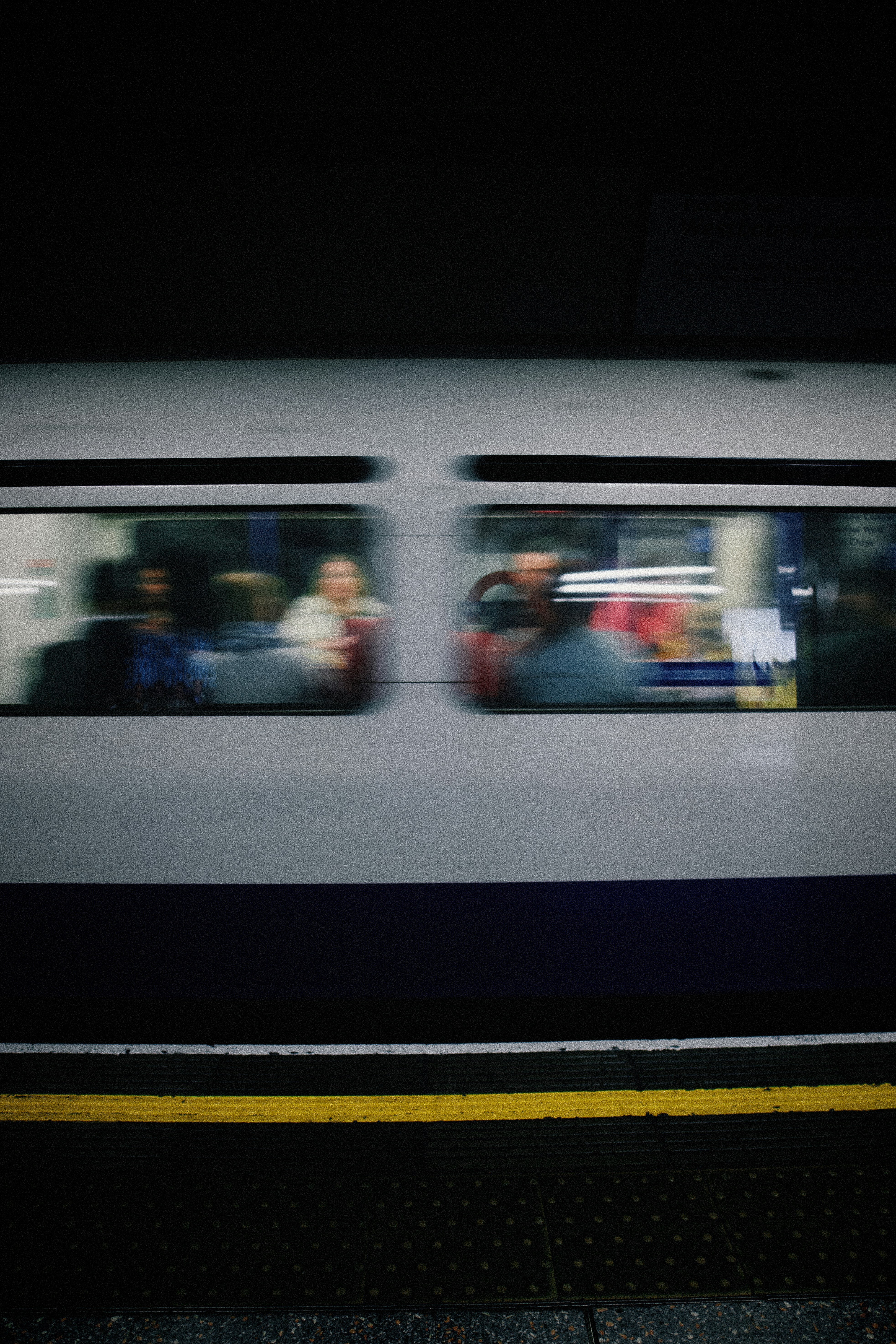 Motion Blur at the Platform: Train Car Windows in Transit