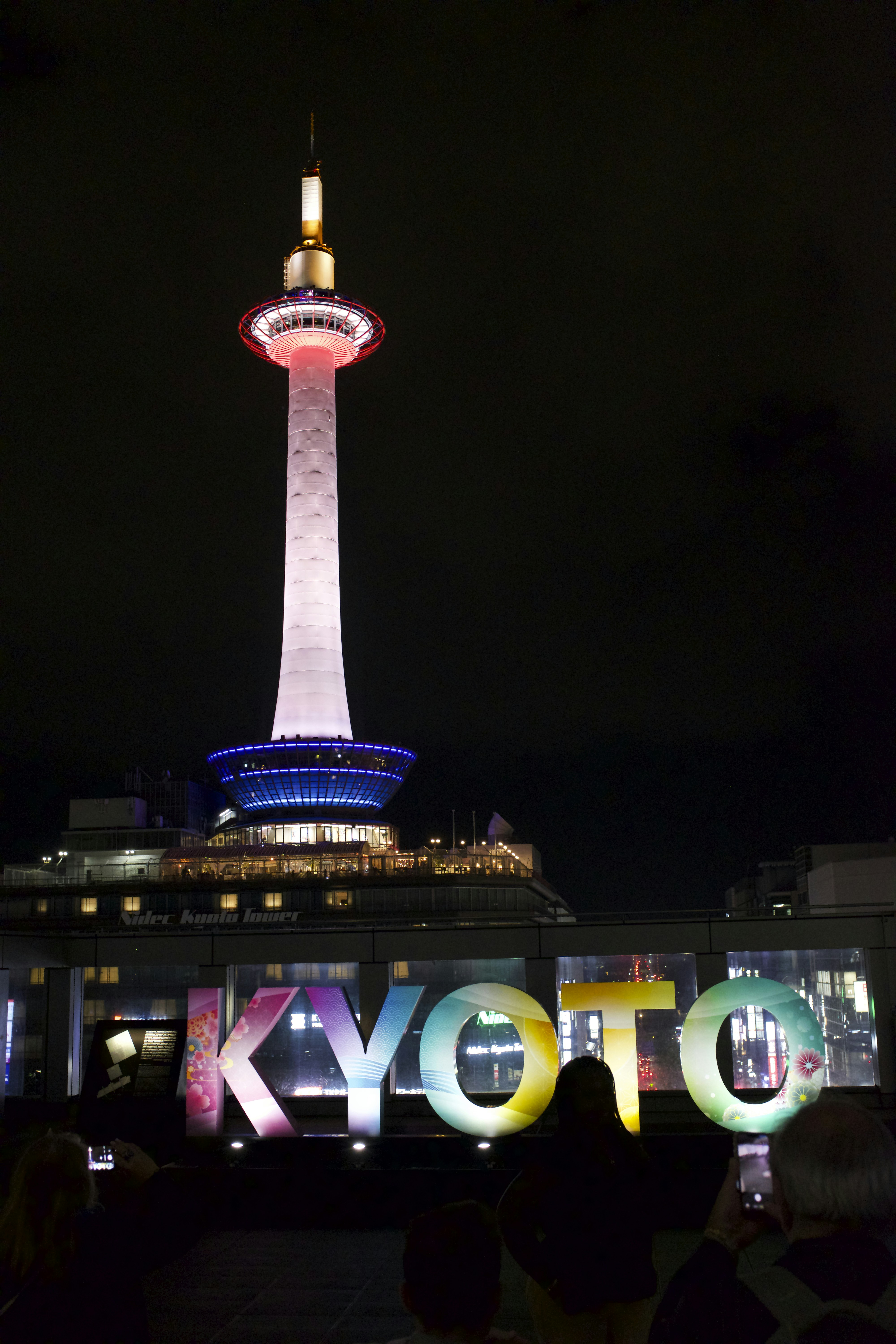 Neon Kyoto: Tower Luminescence Over a City Stage