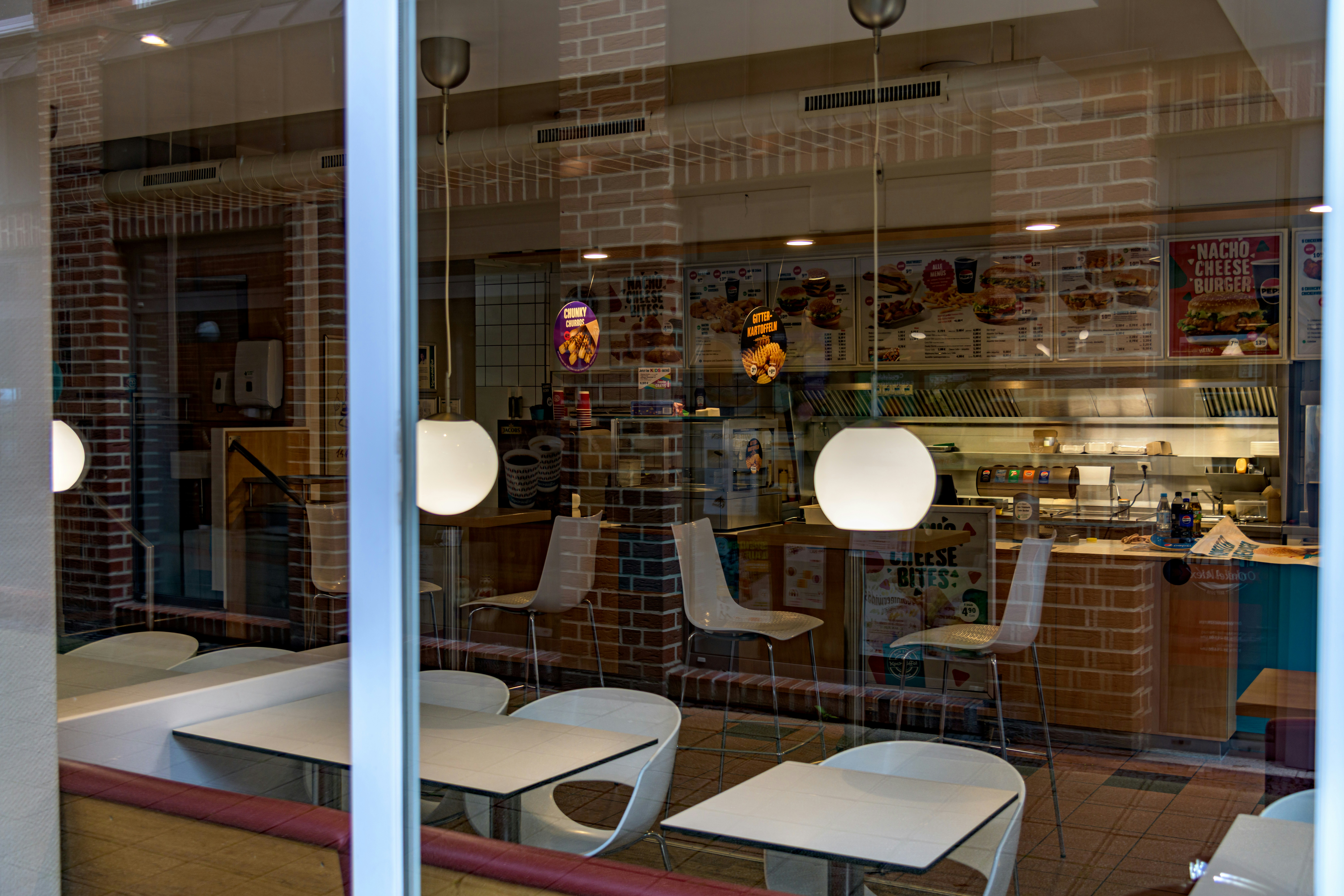 Reflections and Quiet Corner of a Modern Café