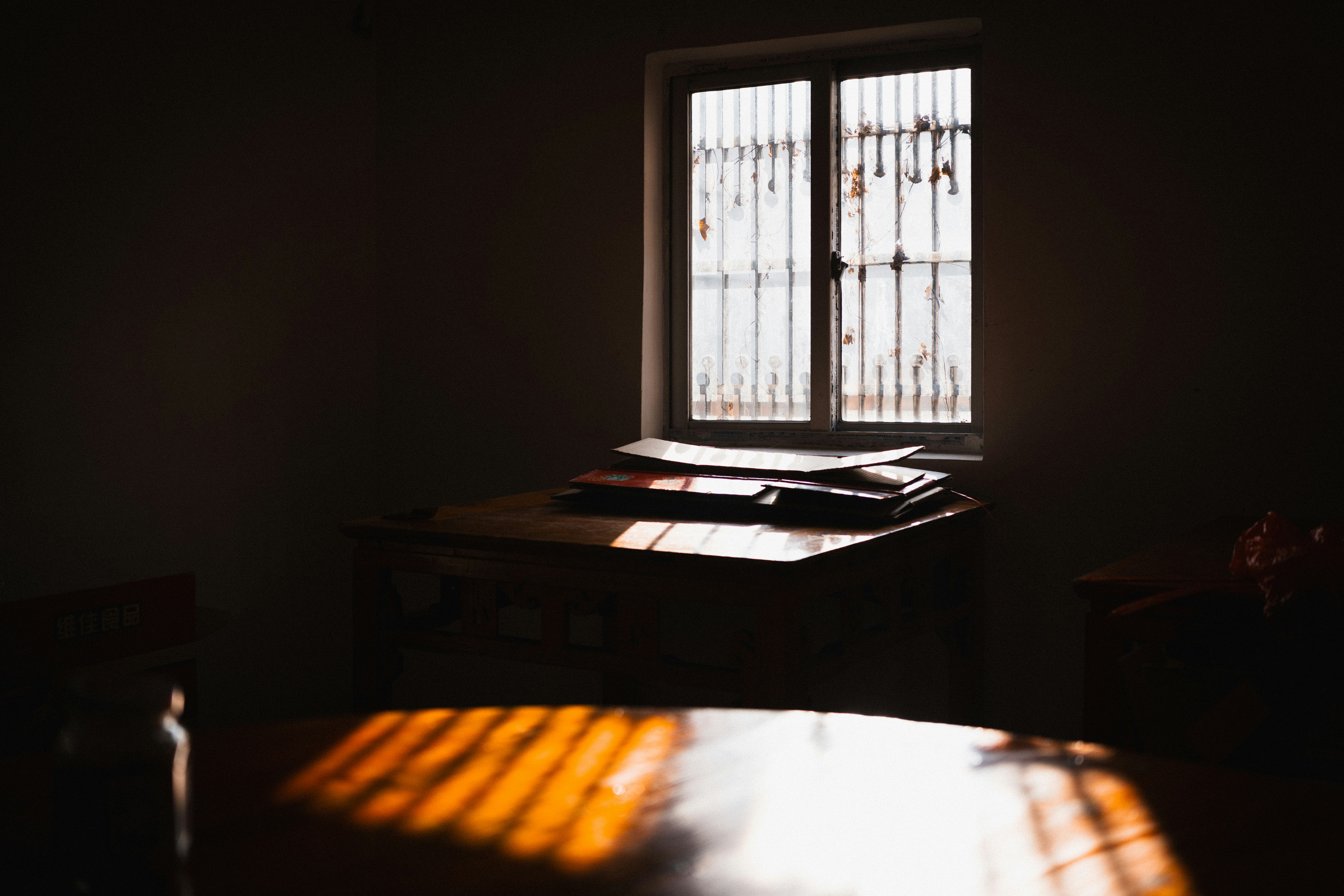Sunlit Table Within a Quiet Windowed Room