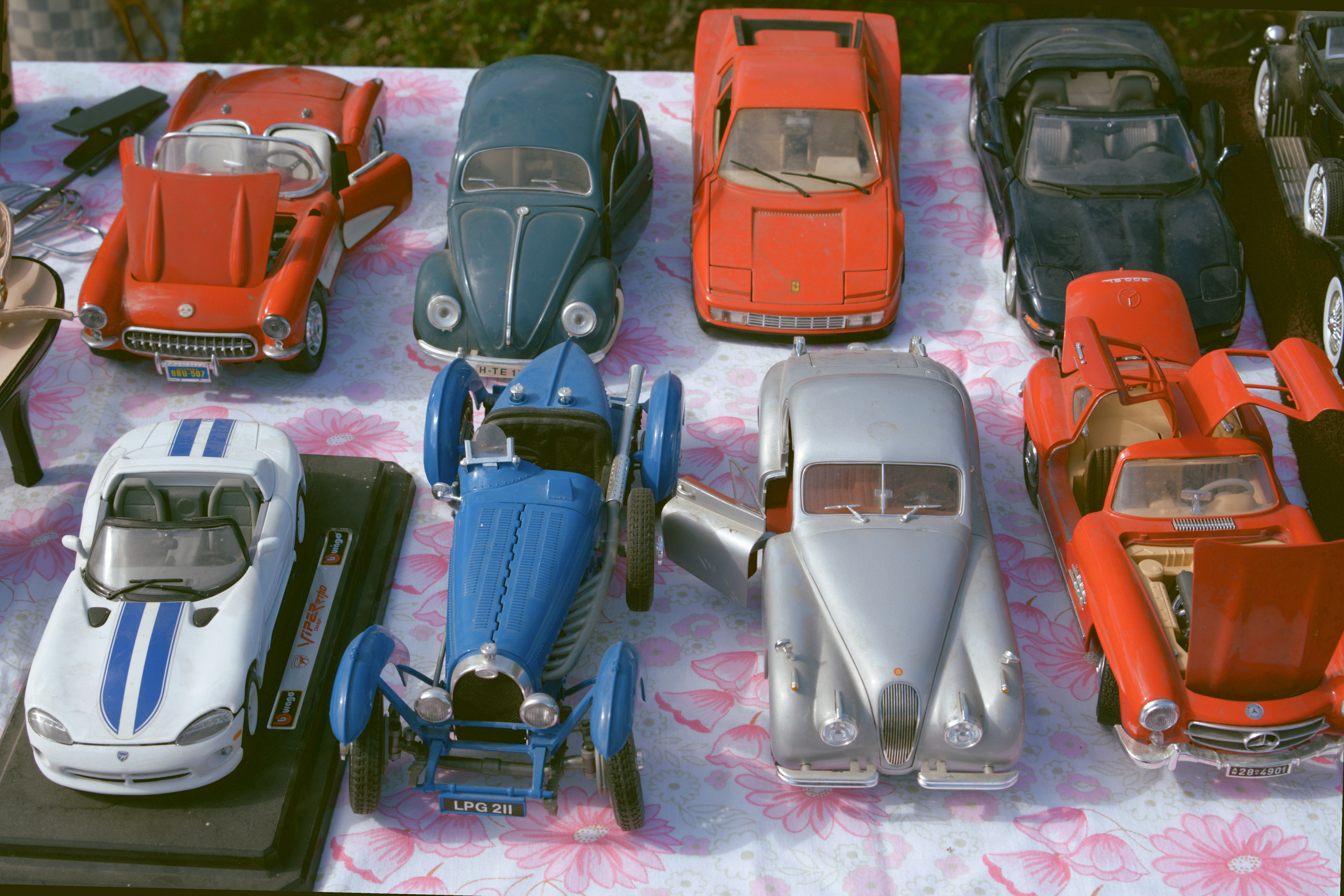 Row of Vintage Toy Cars Basking in Afternoon Light