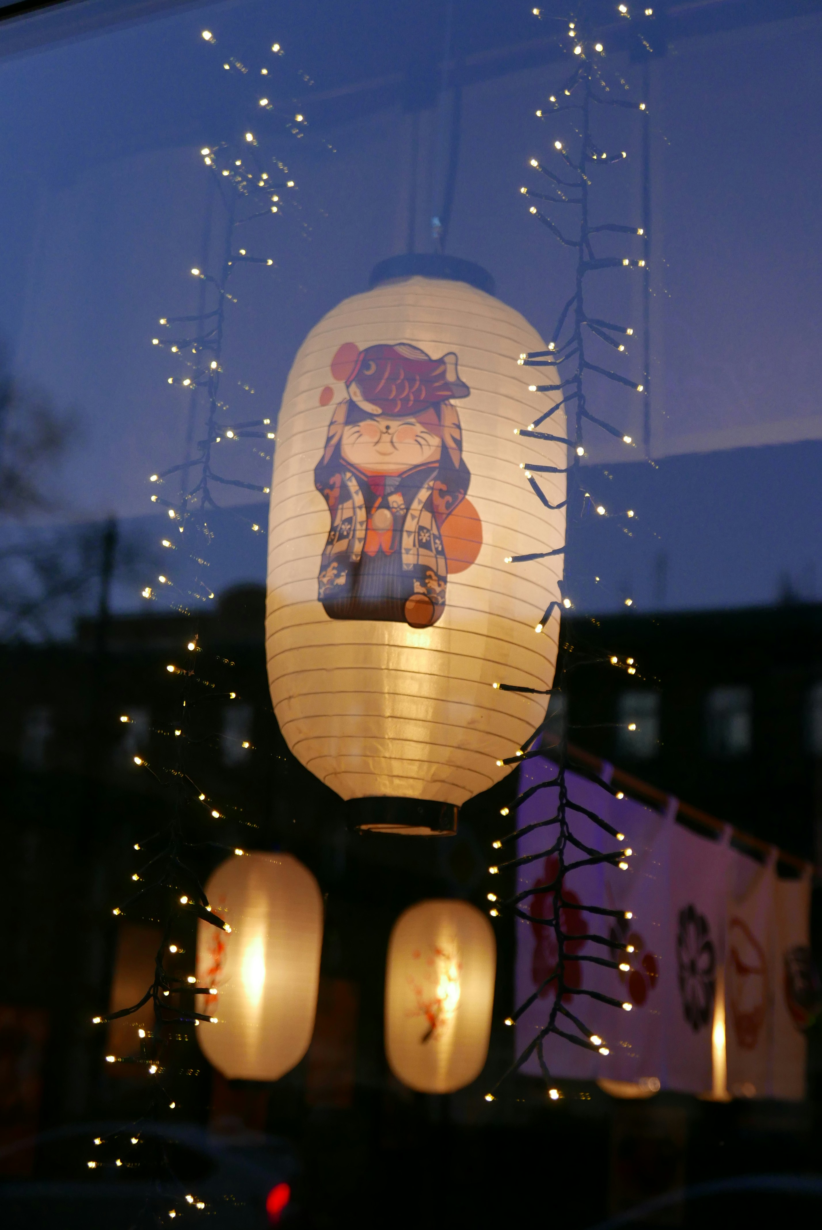 Lantern Glow: A Festive Portrait of a Woven Kimono Lantern