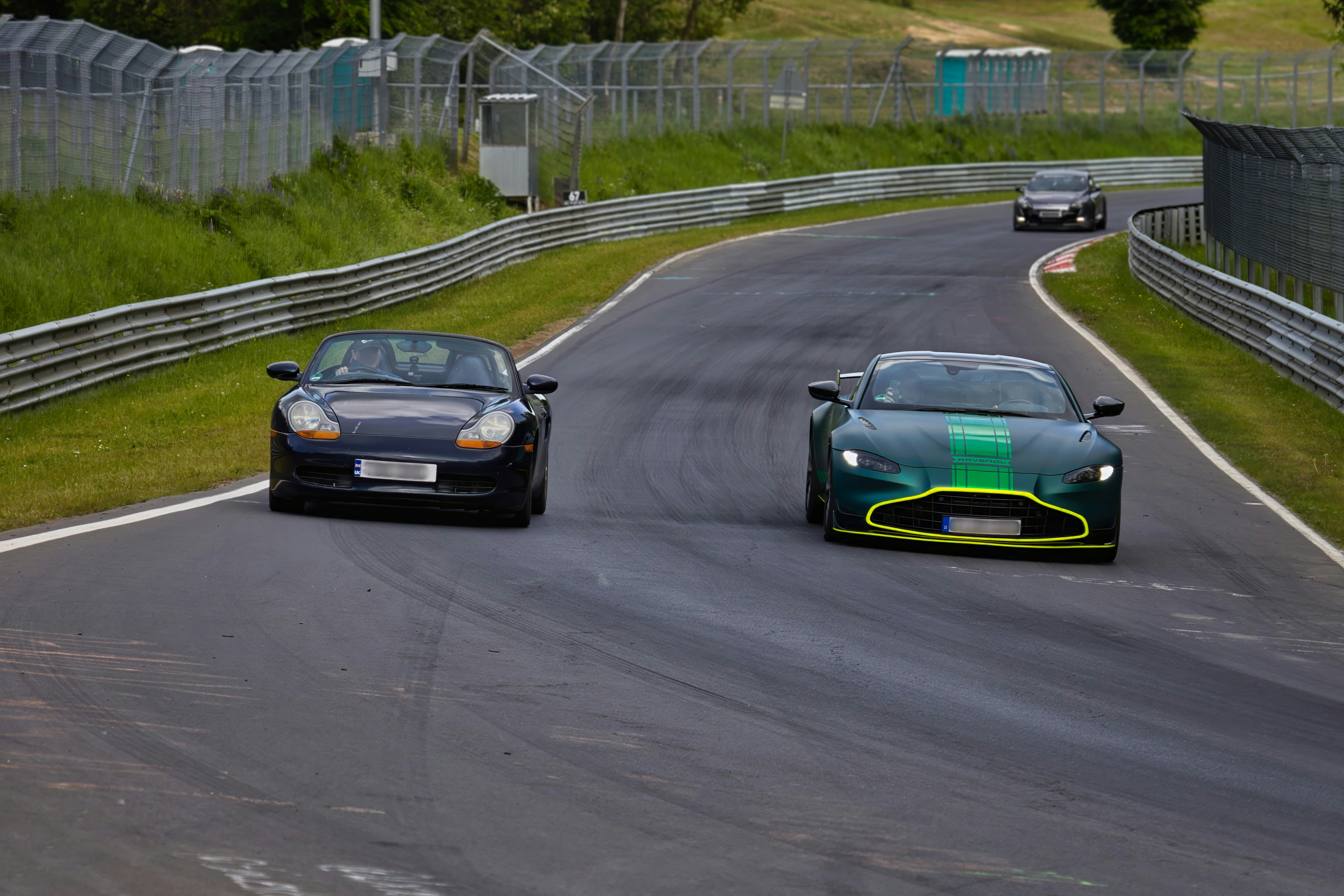Race Pair in the Helical Wake: Two Convertible Beauties On a Winding Track