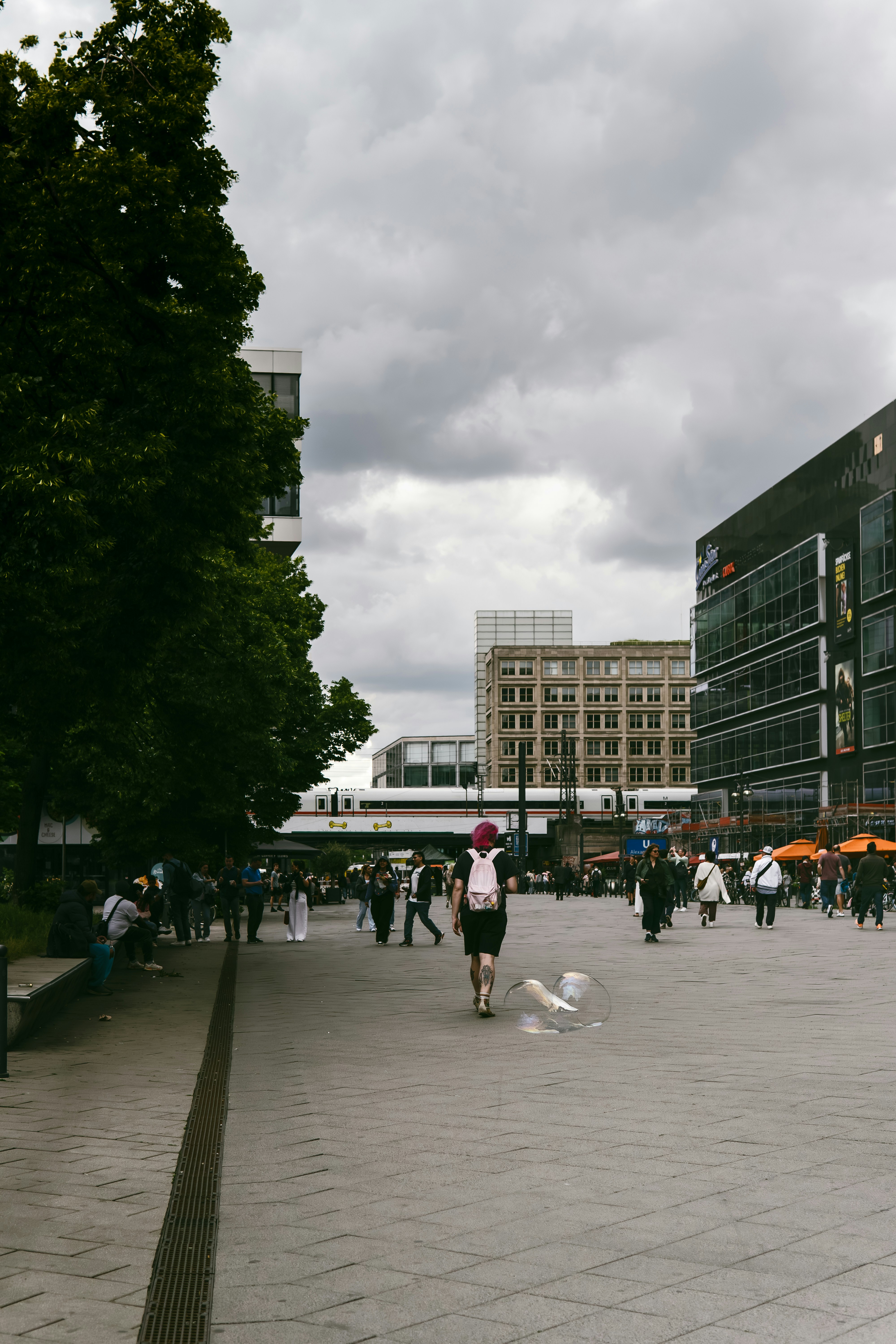 Urban Footfall: A Pedestrian Parade Through the City Square