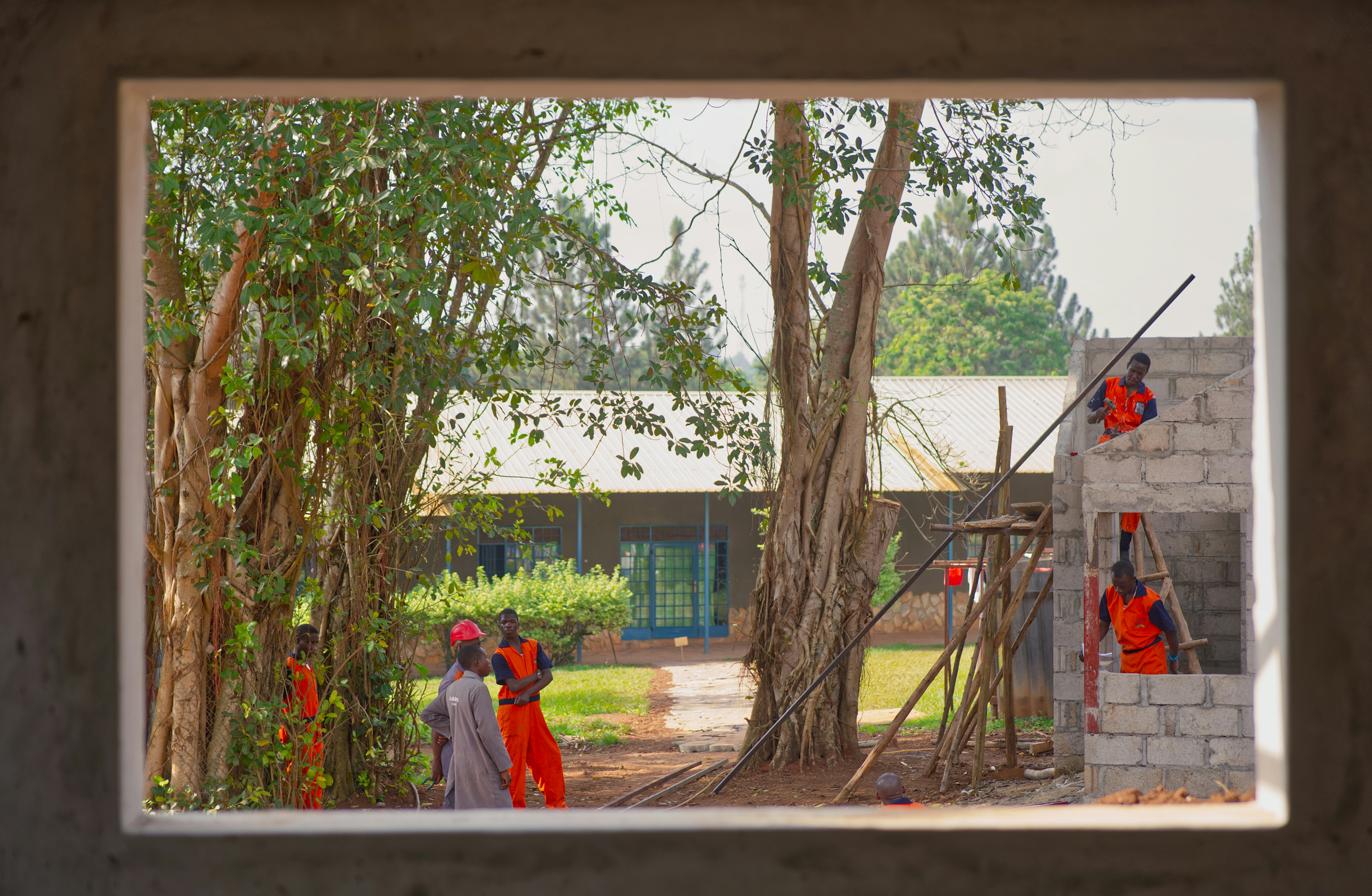 Construction in a Framed Village: Builders at Work Beyond the Window