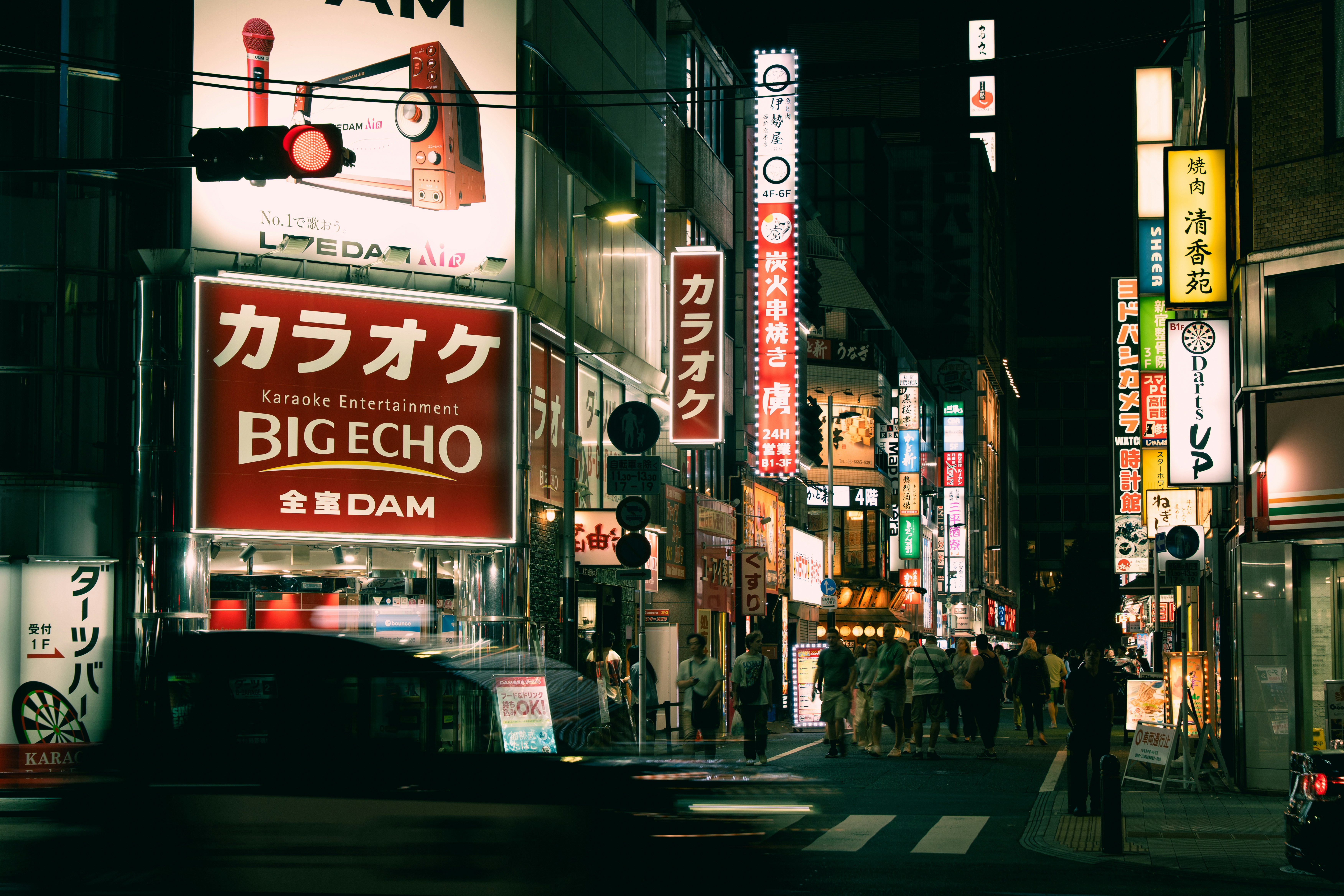 Neon Pulse of Shibuya: Nightlife Amid Kicking Signboards