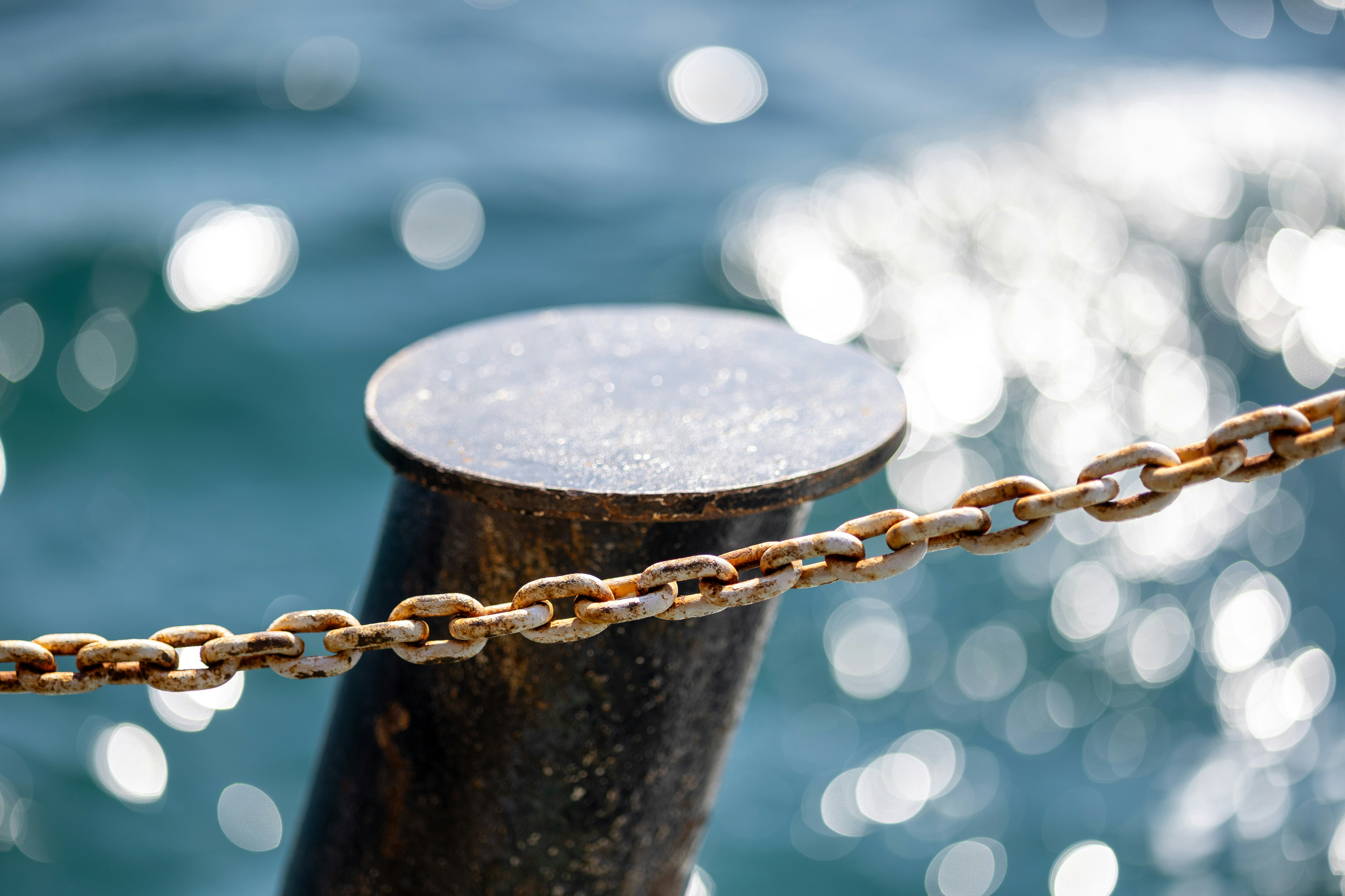 Chain Confidently Bound to the Pier's Post