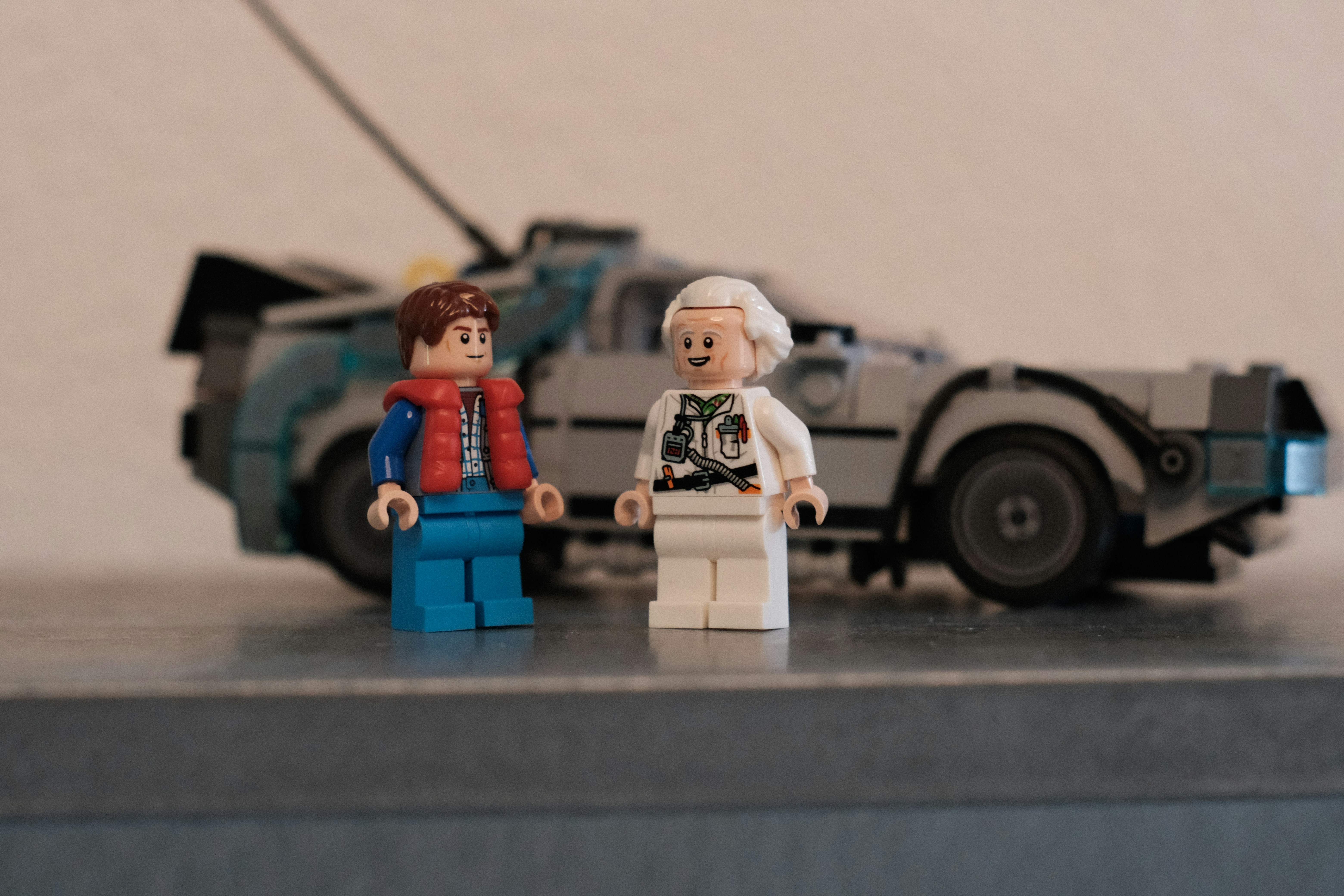 Lego marty mcfly and doc brown with delorean time machine.
