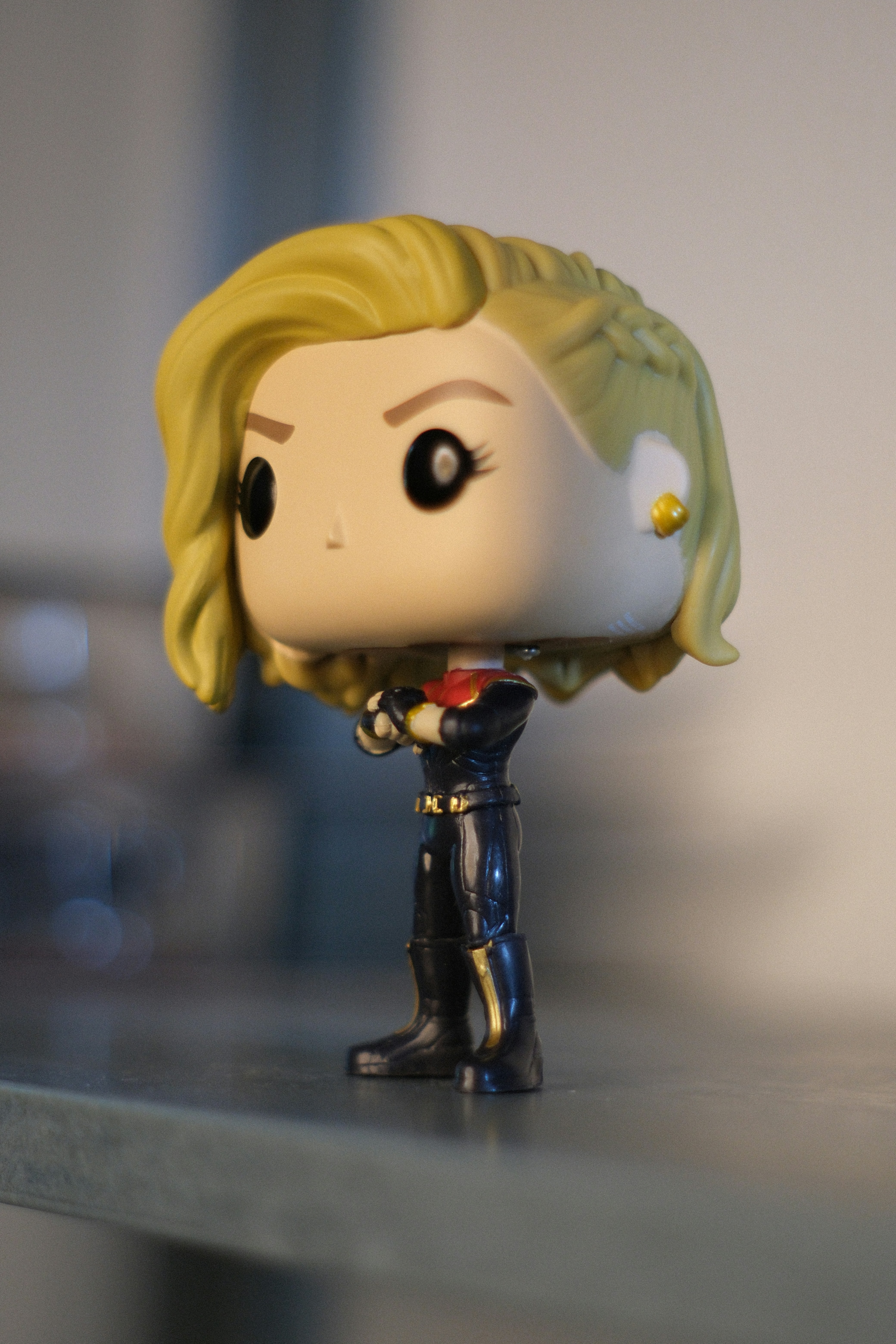 Miniature Hero in Focus: A Blond-Quiffed Standoff