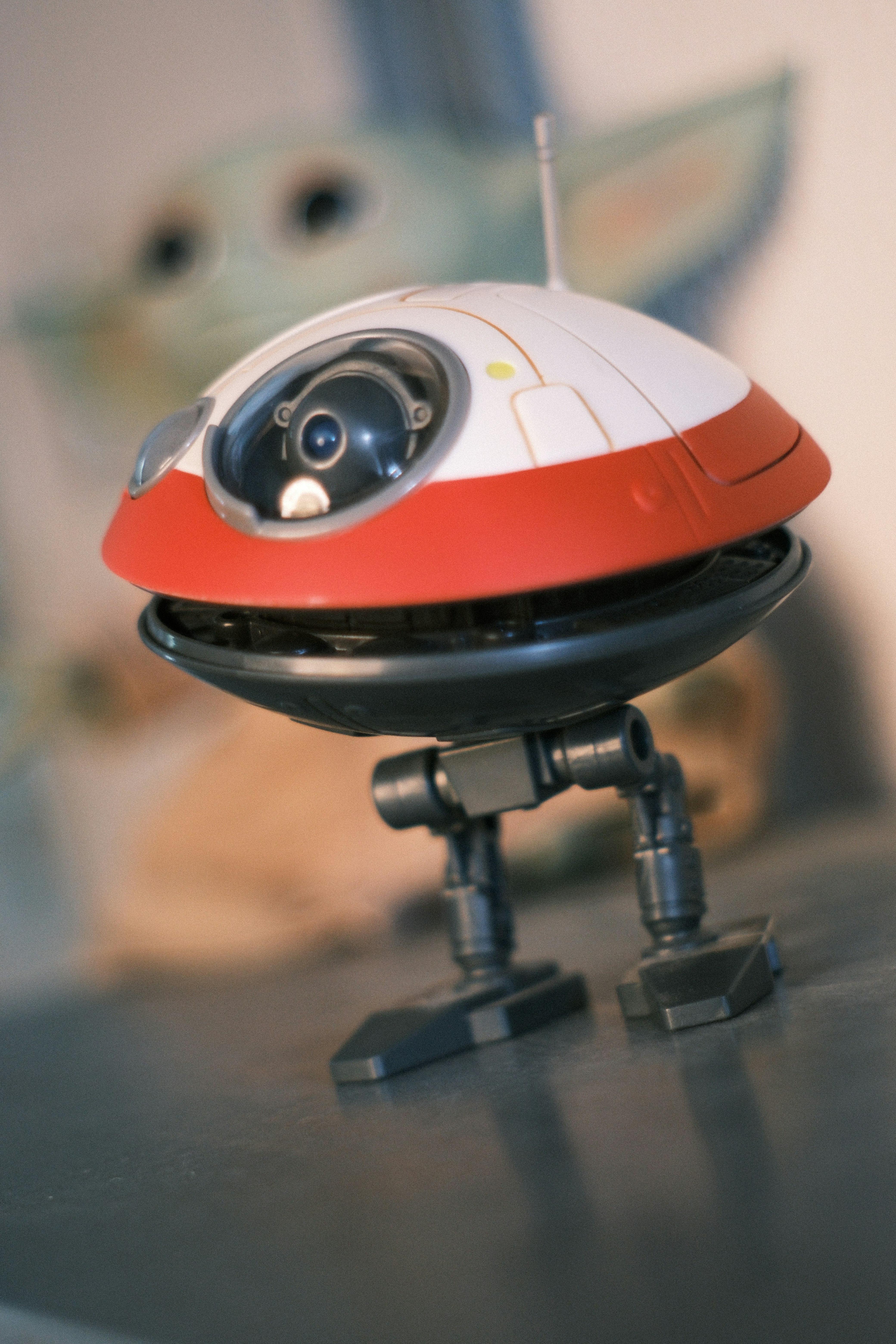 Red-Topped Scout: A Tiny Robot Stares Out