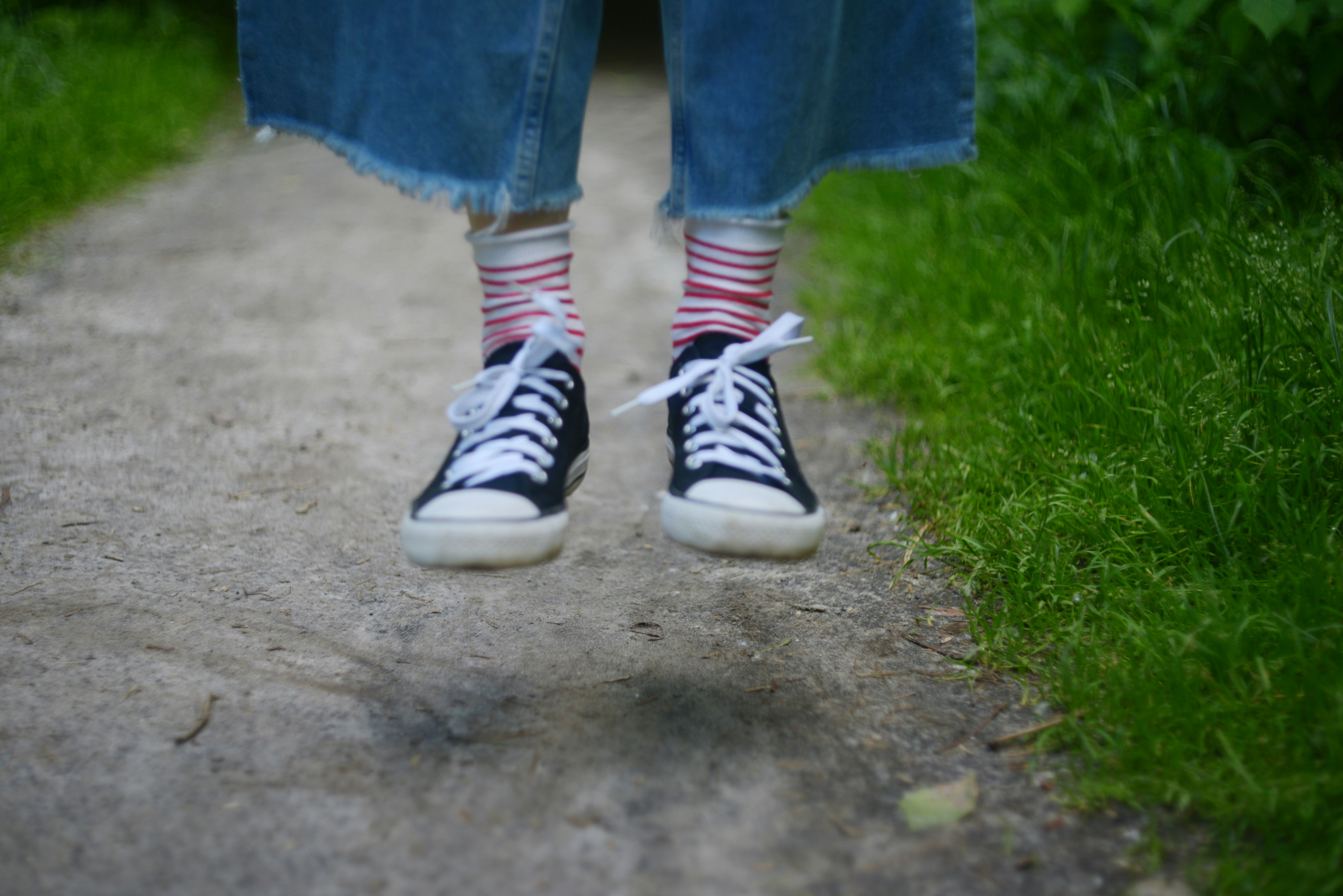 Gravity-Defying Kicks: Sneakers Anchoring a Quiet Path
