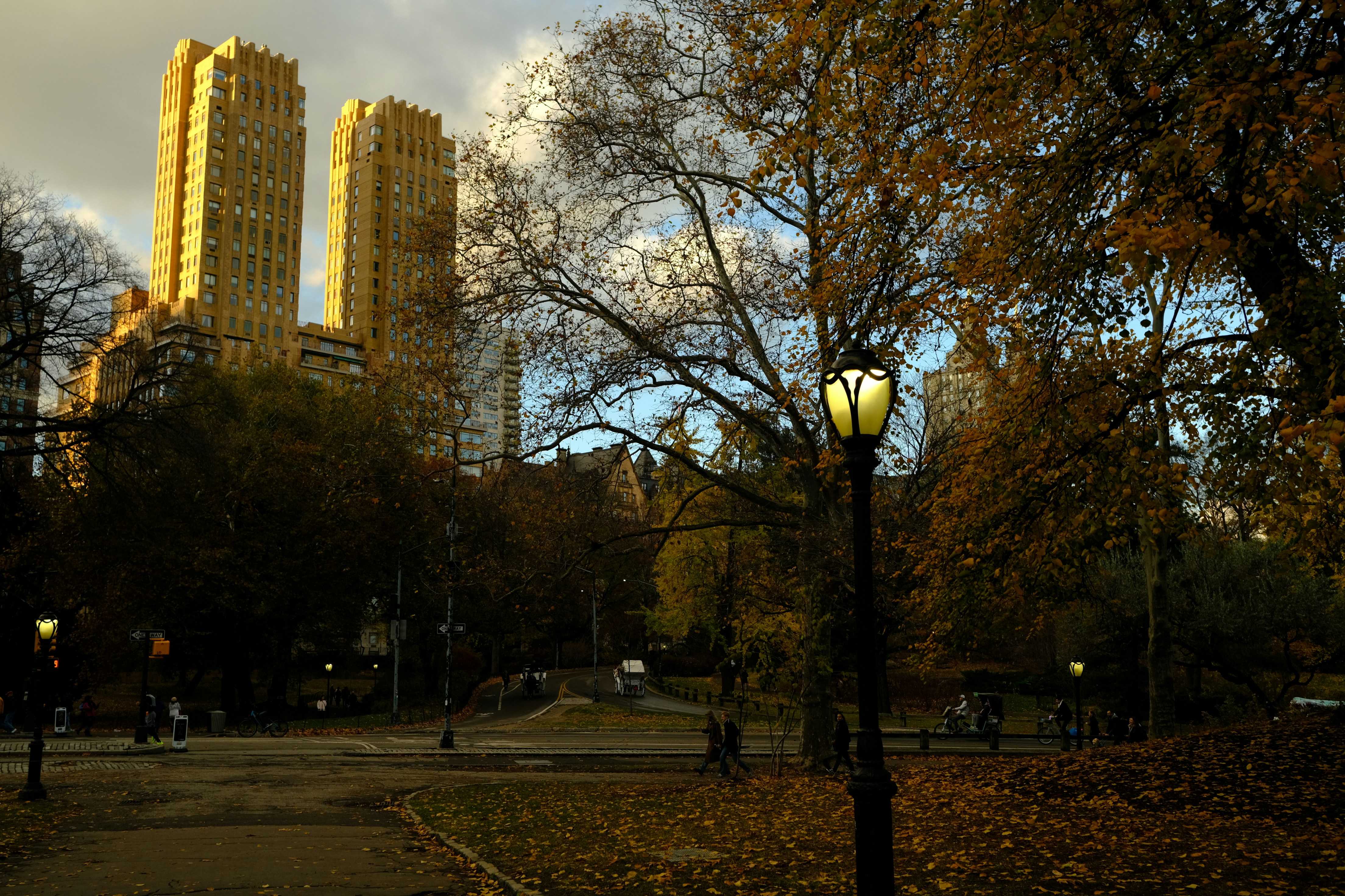 Autumn Park Lantern Under the Urban Skyline