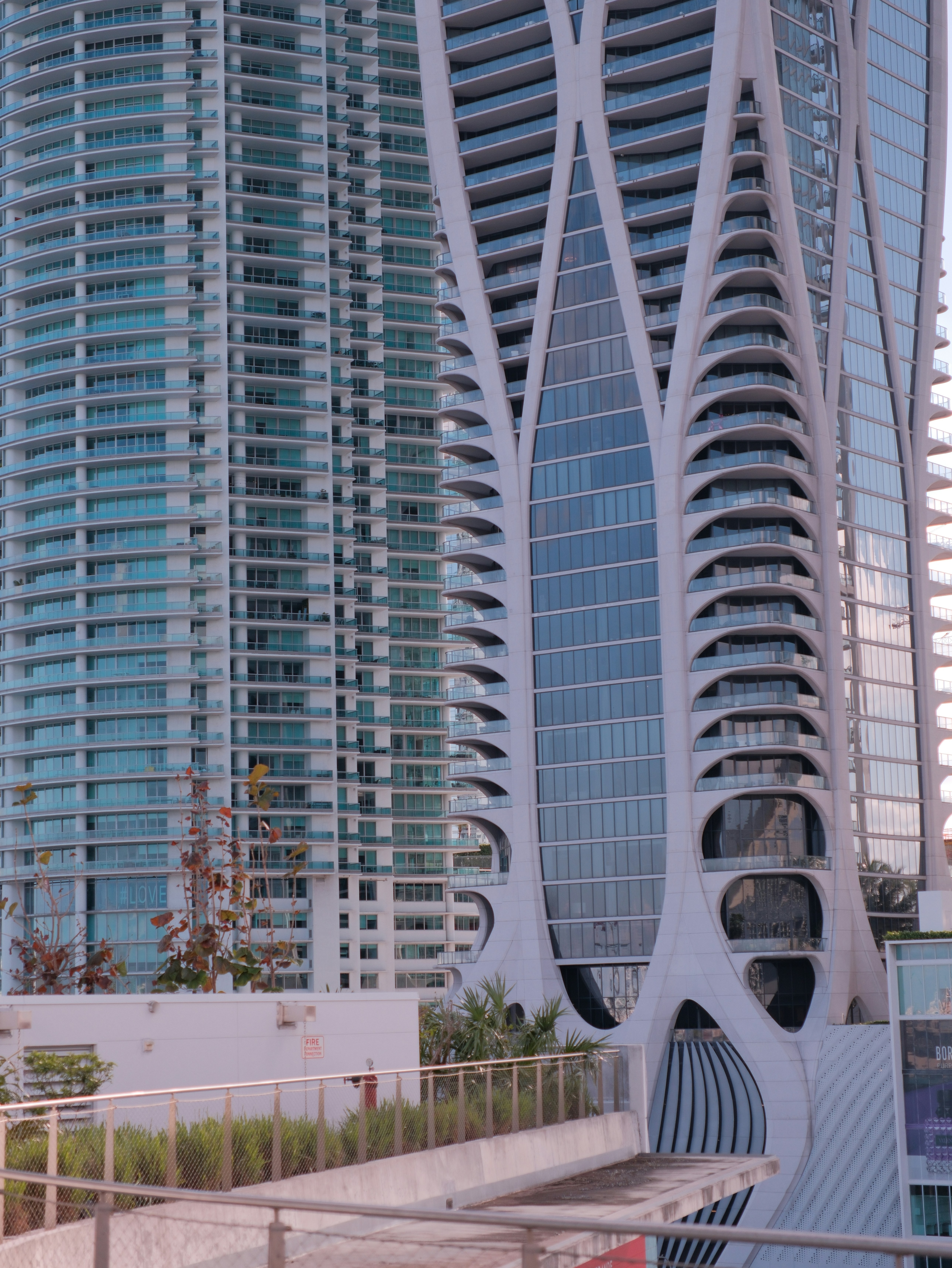 Tower of Arches: Facade of Curves and Cranes