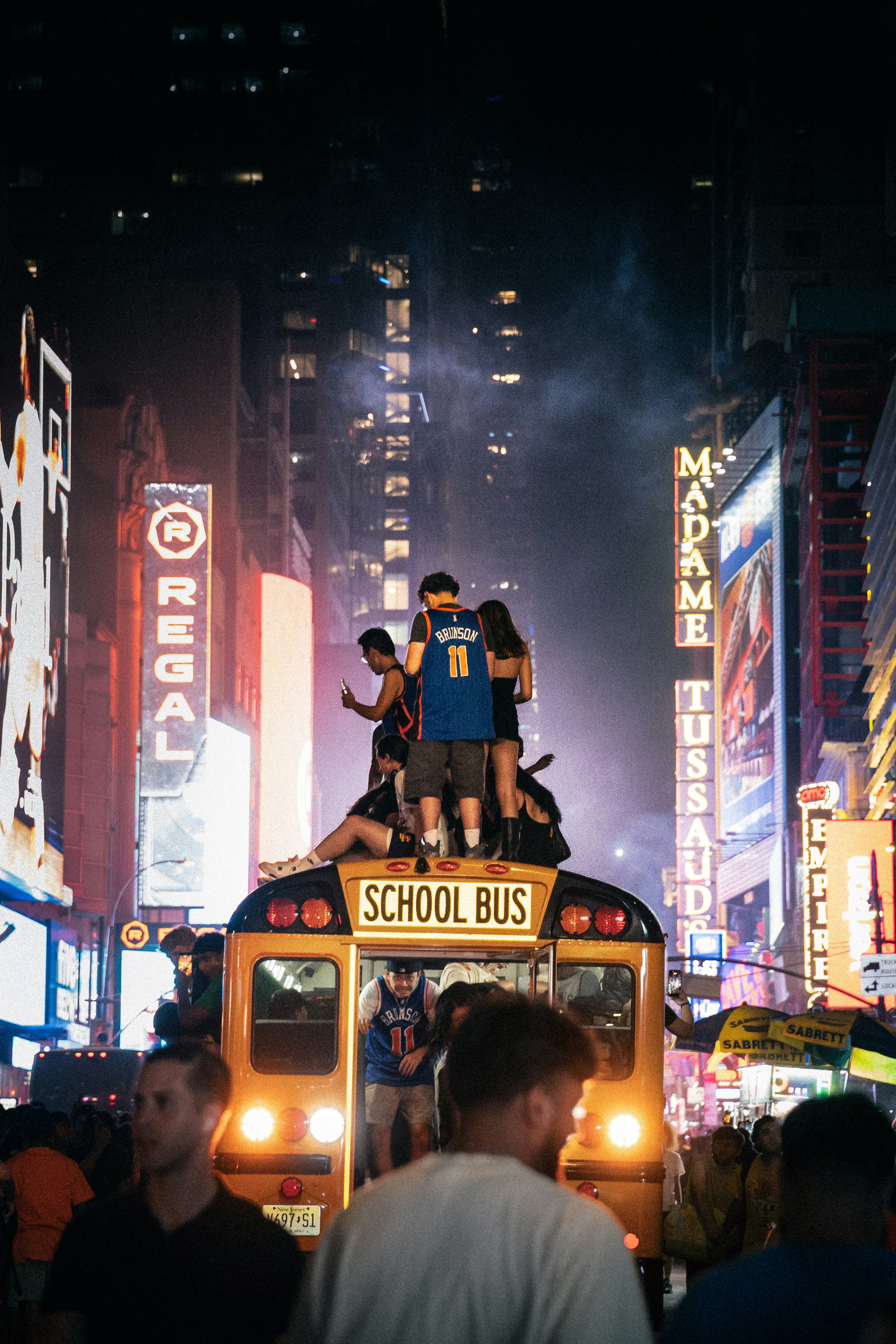 Midnight Parade: Teenagers Crown the School Bus in Neon Chaos