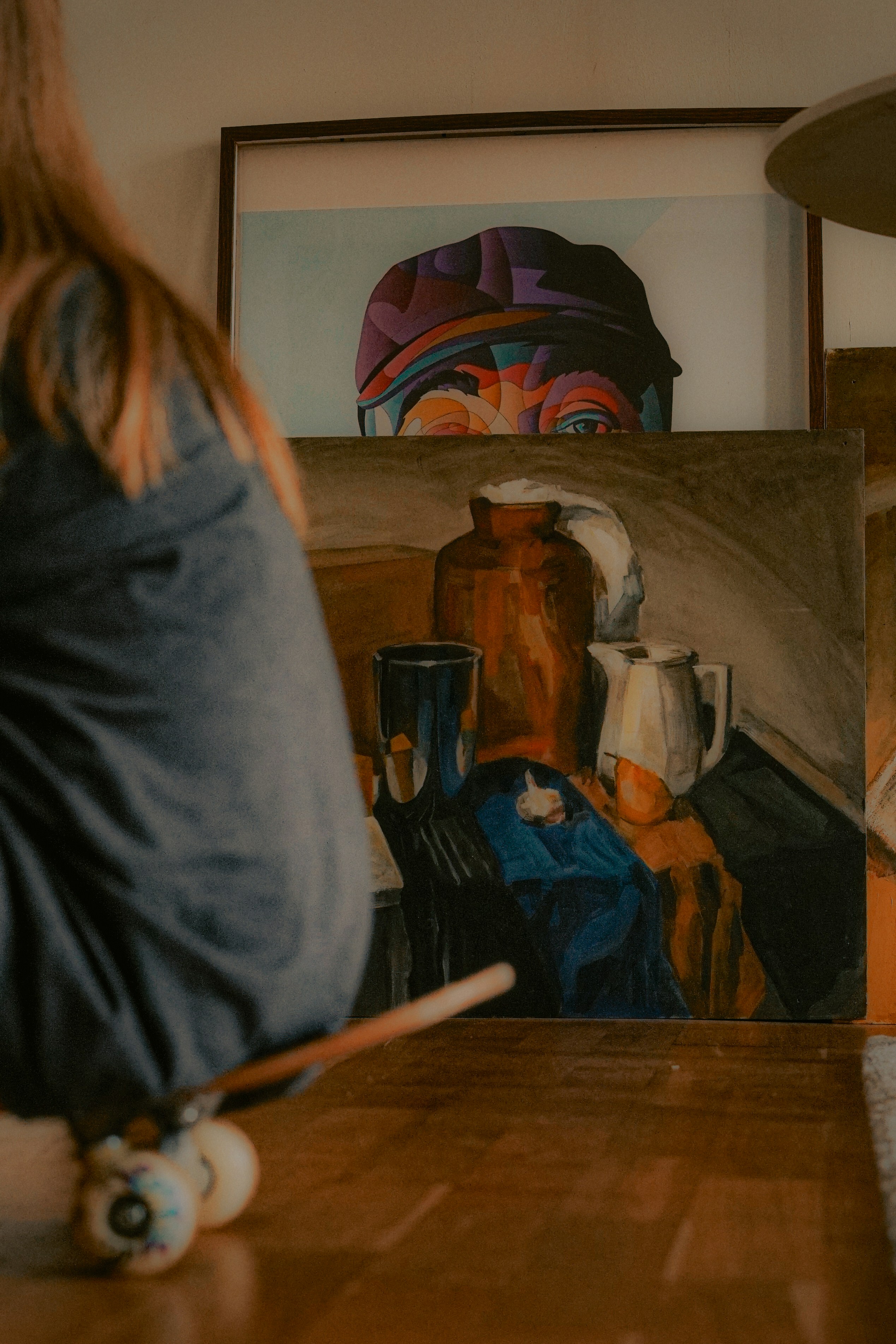 Studio Still Life: Painted Portraits Behind an Easel