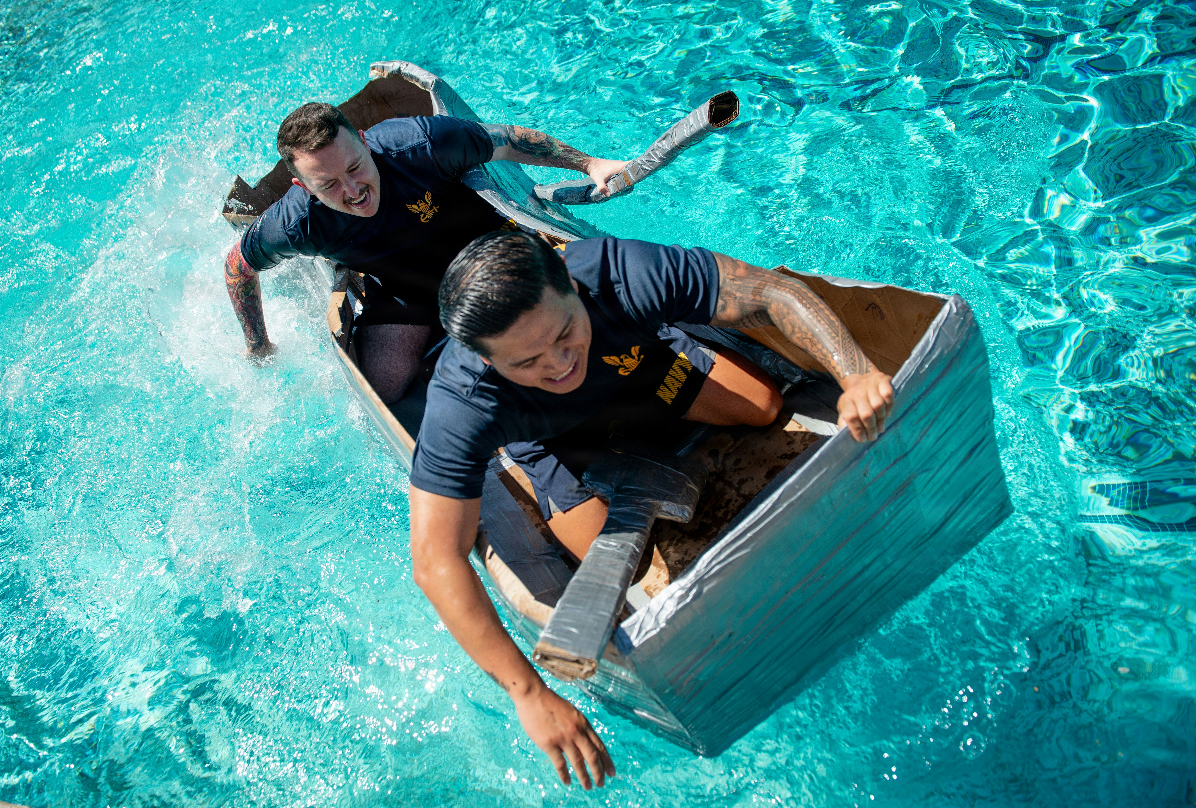Two Lifters Ride a Foam-Blue Wave: Boarded Escape in a Pool