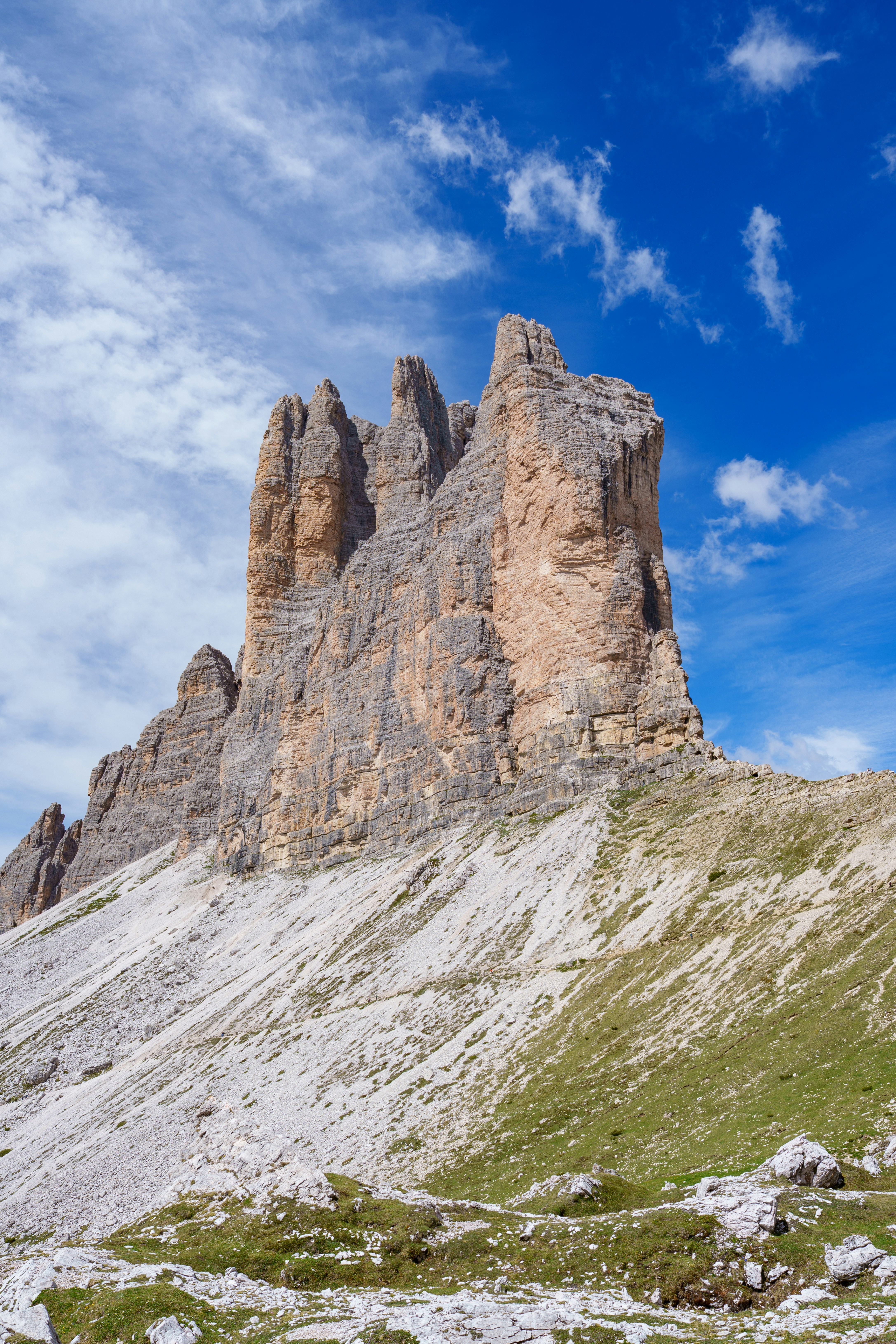 Towering Peak of Dolomitic Spires Under a Cerulean Sky