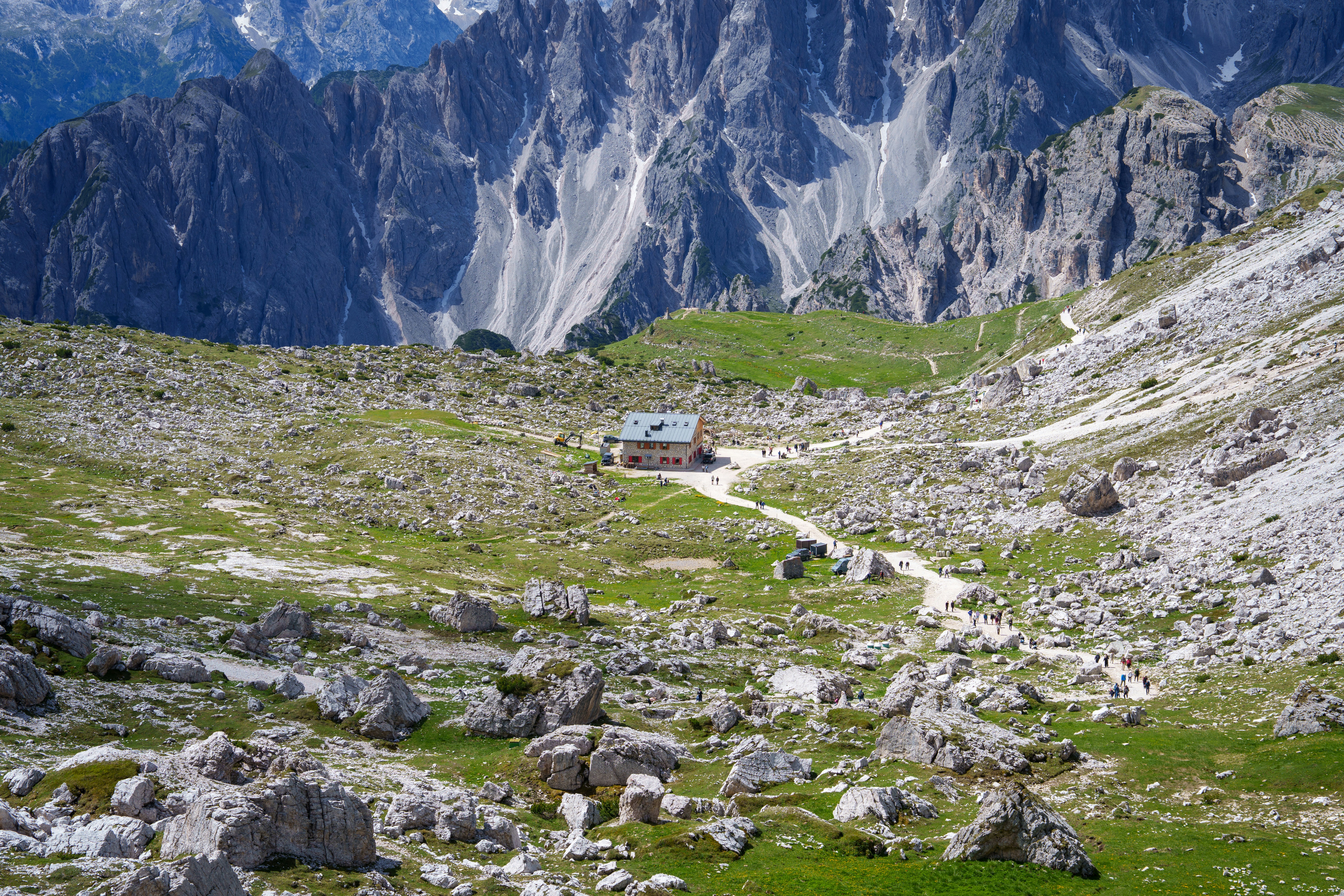 Stone Lodge Amid Alpine Giants