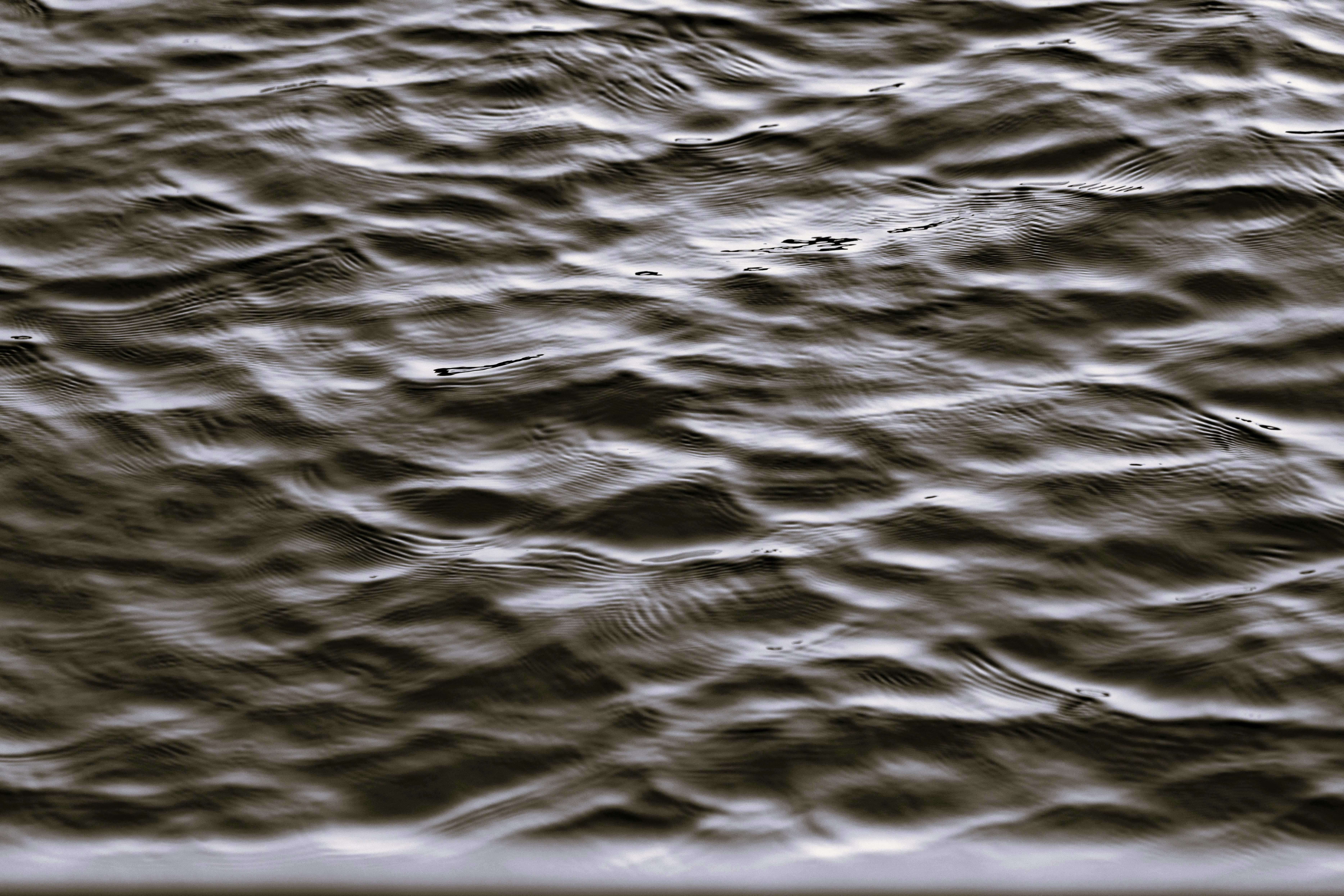 Smooth Currents: Quiet Ripples Across a Duskened Surface