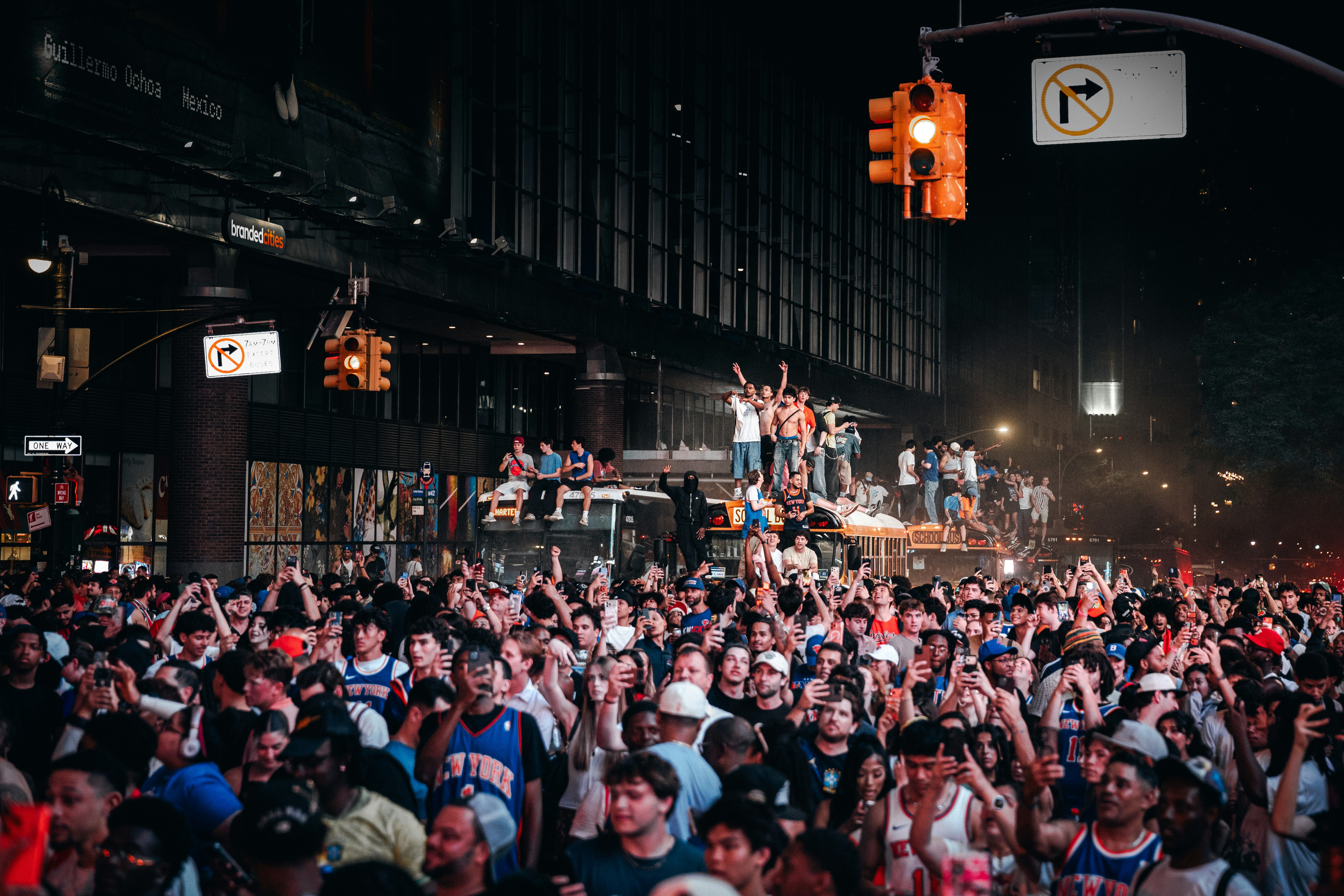 Center of the Night Pulse: Crowd Surges Under Urban Streetlights