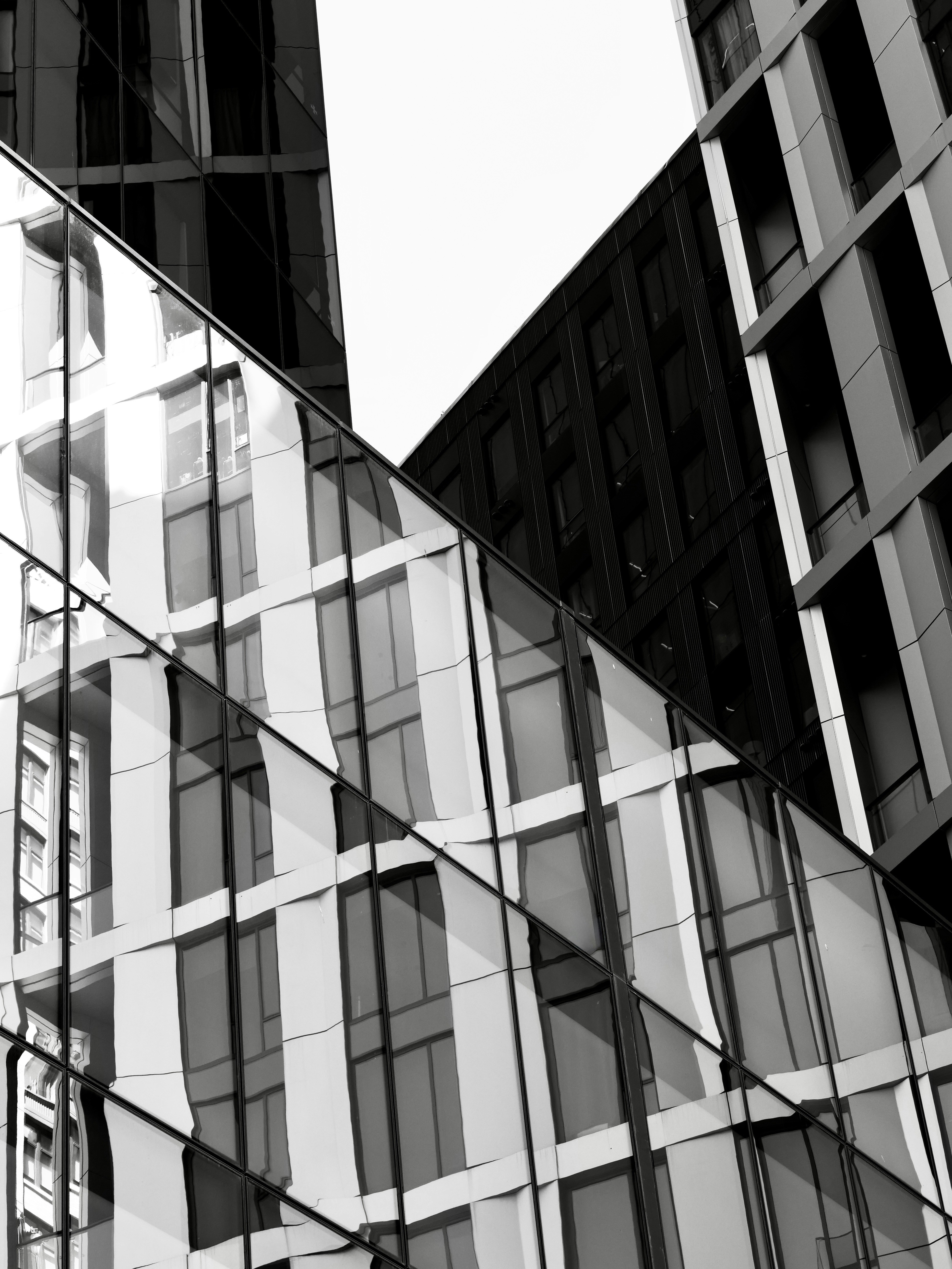 Interwoven Glass Facades: A Diagonal Dance ofreflections