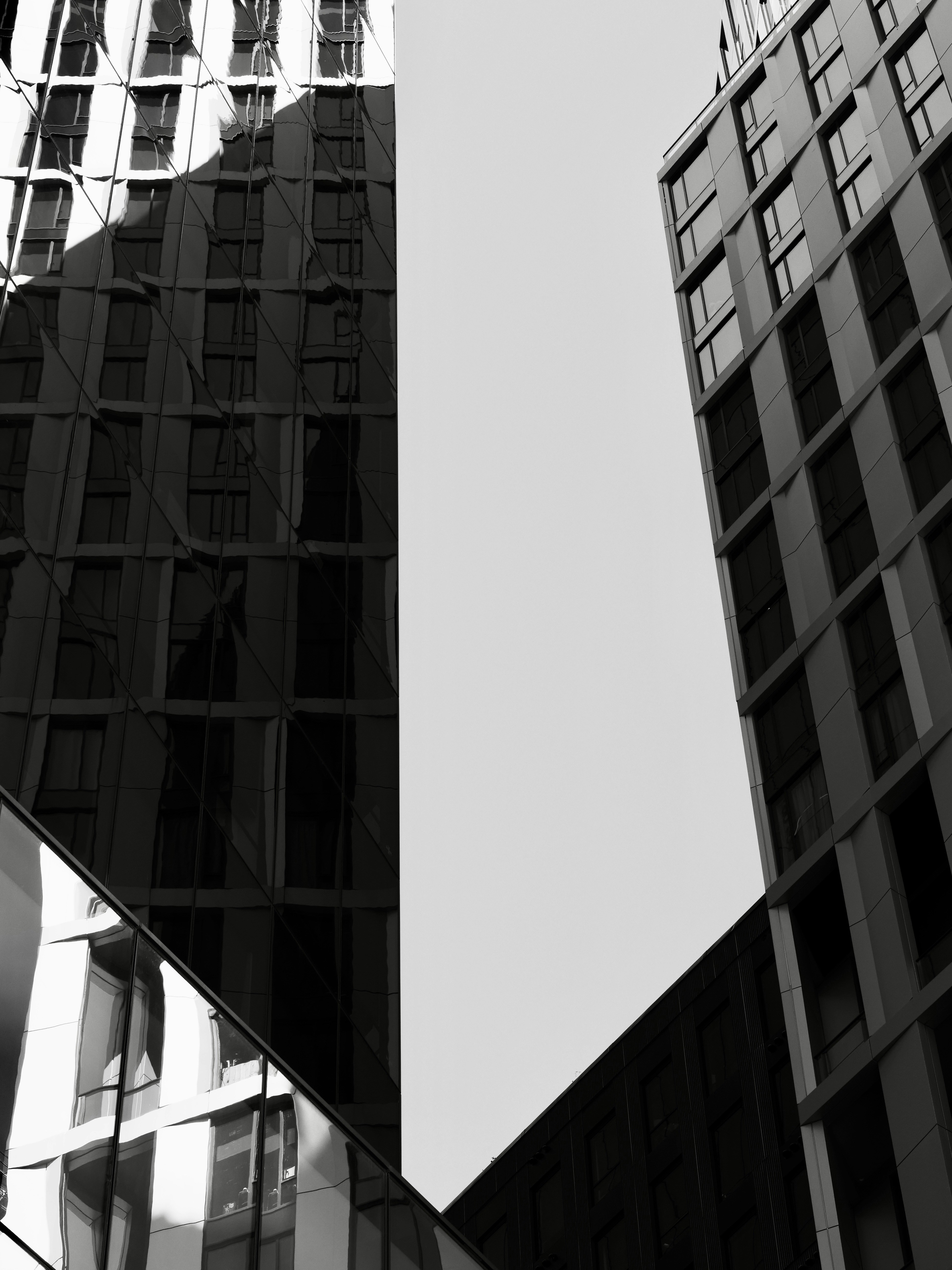 Concrete Geometry: Skyscrapers Framing a Narrow Sky