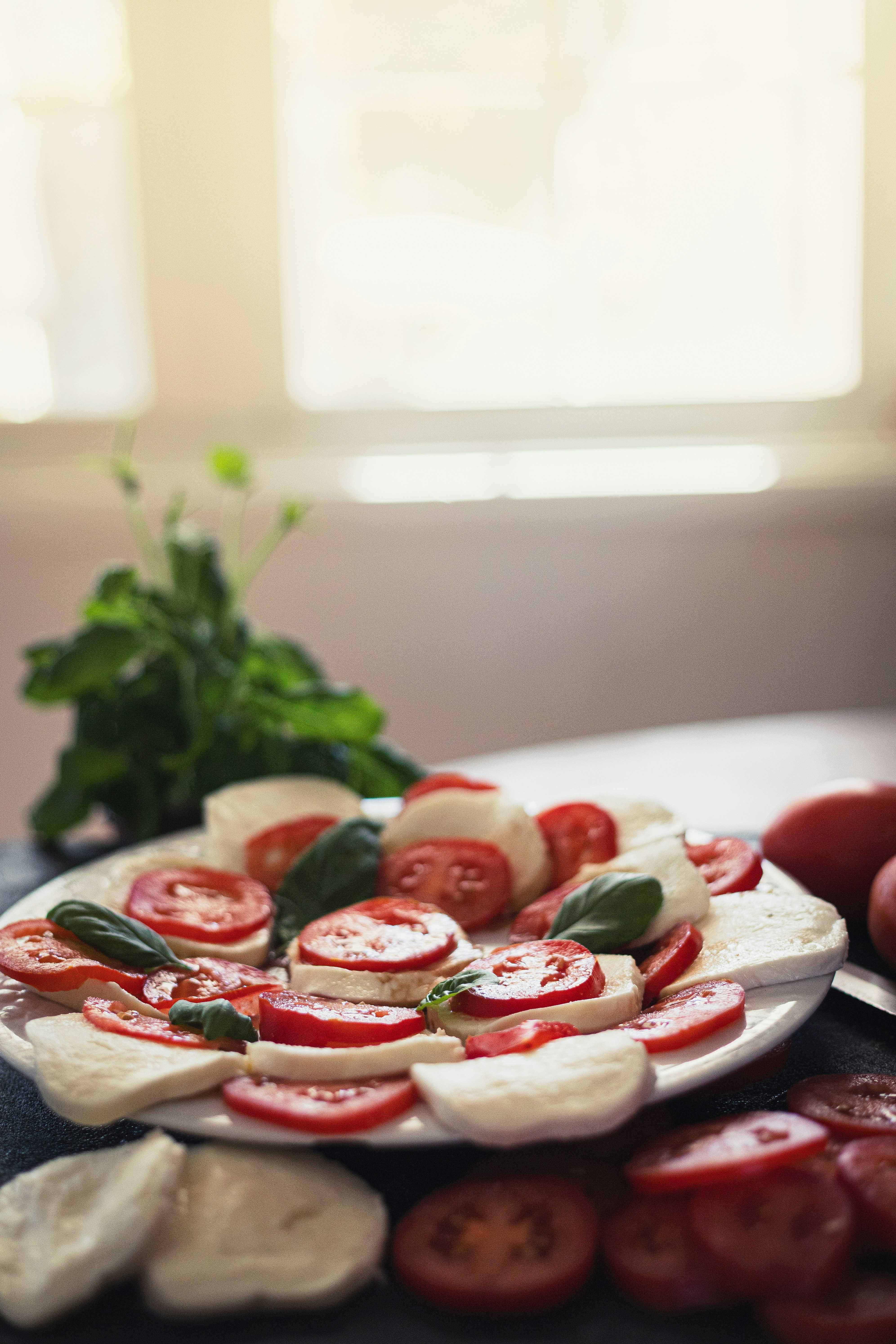 Caprese Arrangement on a Sunlit Kitchen Table