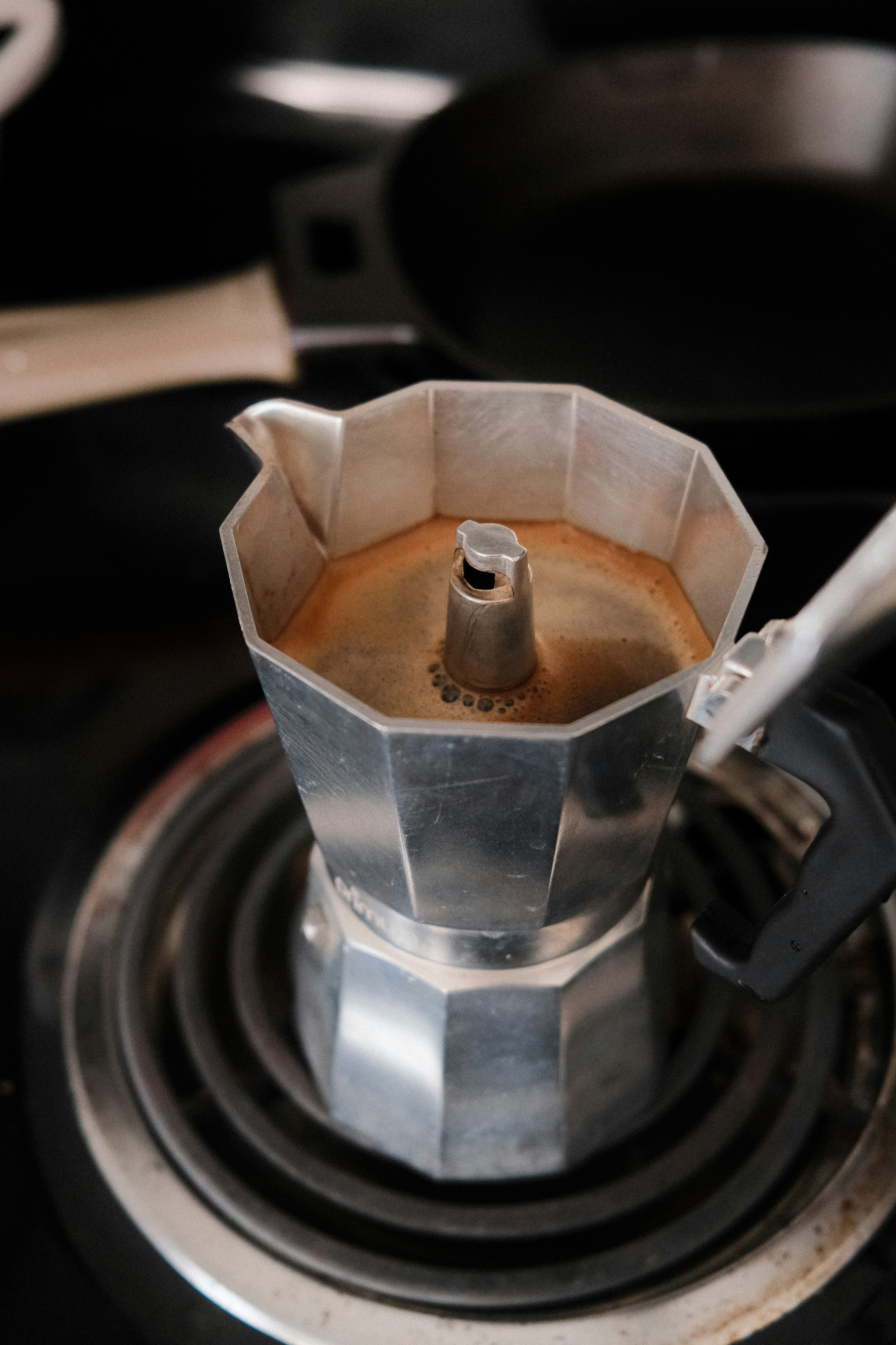 Aged Steam: Close-Up of a Stovetop Moka Pot Ready to Brew