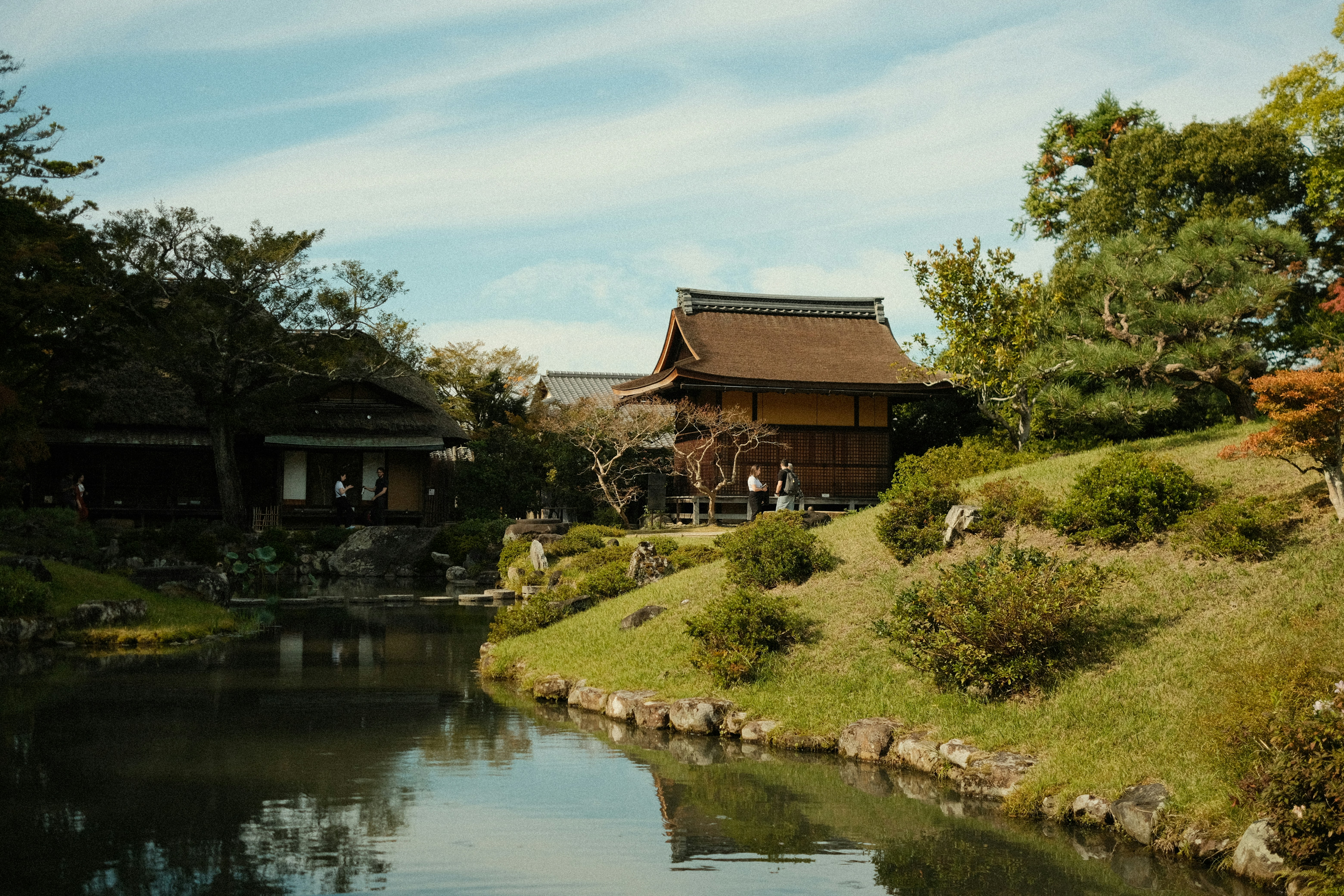 Tranquil Riverside Courtyard with Traditional Japanese Architecture