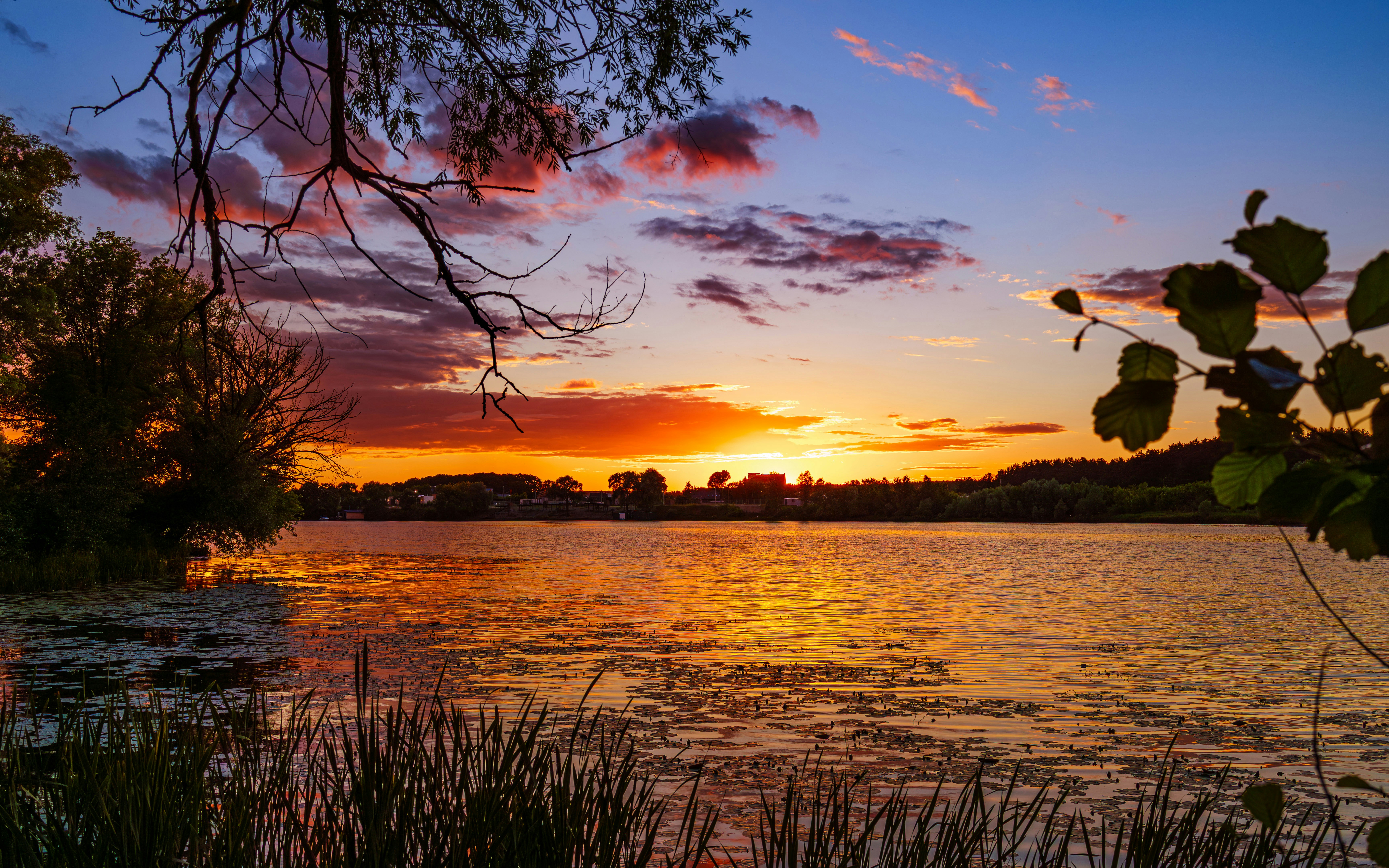 Horizon Fire: Sunset Over Quiet Water