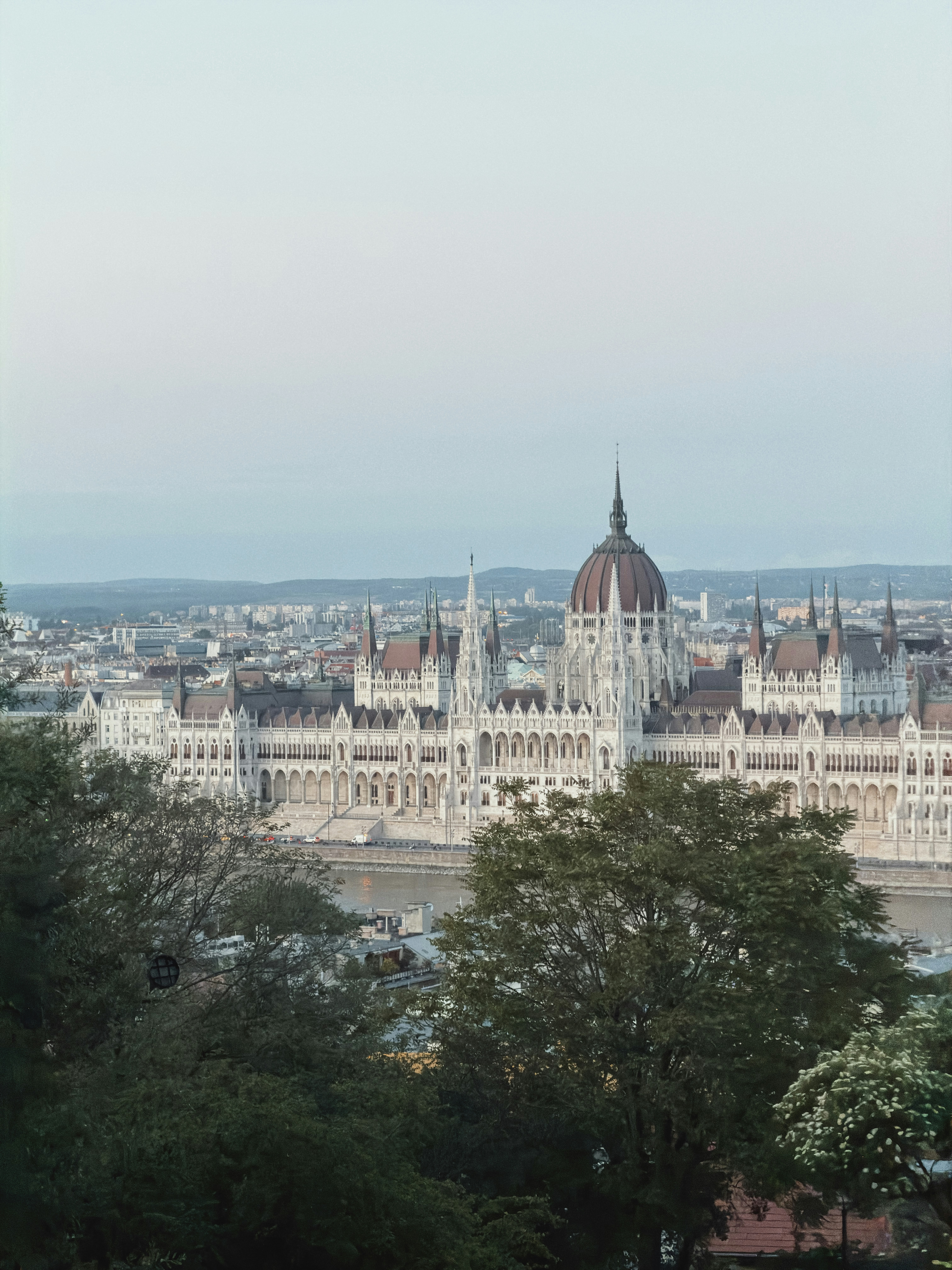 Budapest’s Parliament Crest: Stone Spires Against a Quiet Horizon