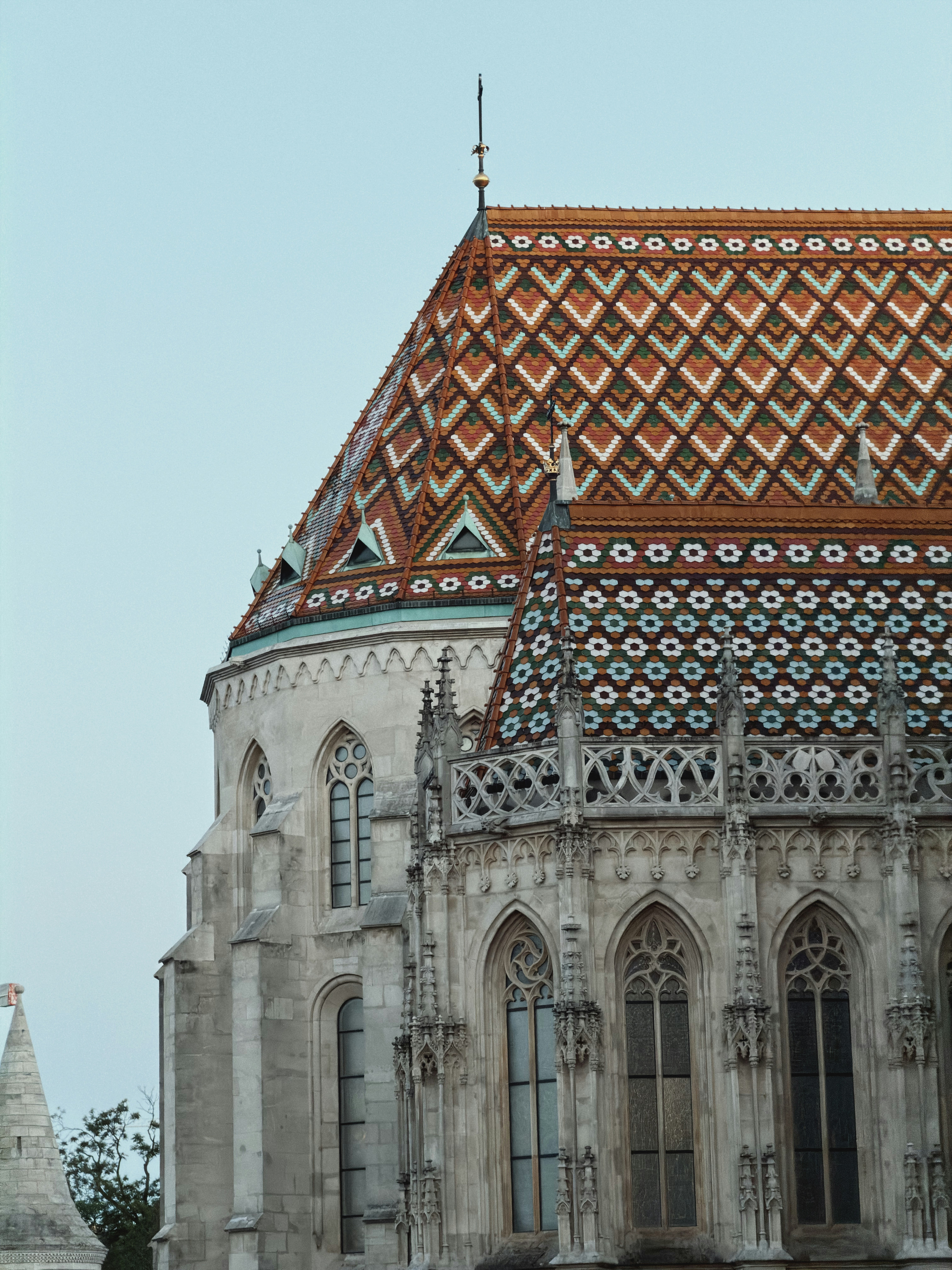 Tiled Rooflines and Gothic Details of a Historic Fortified Chapel