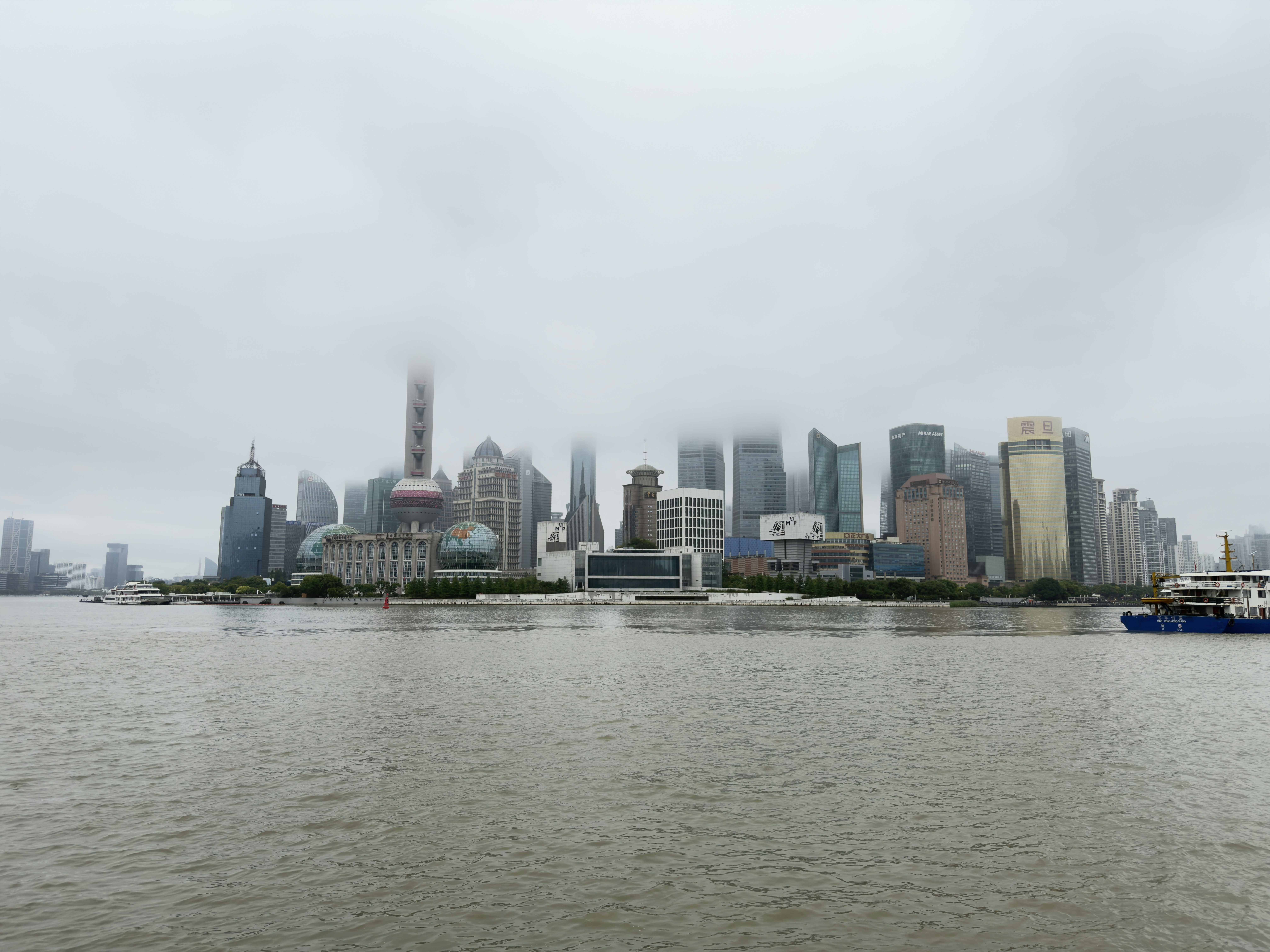 Shanghai Silhouette Across Grey Waters