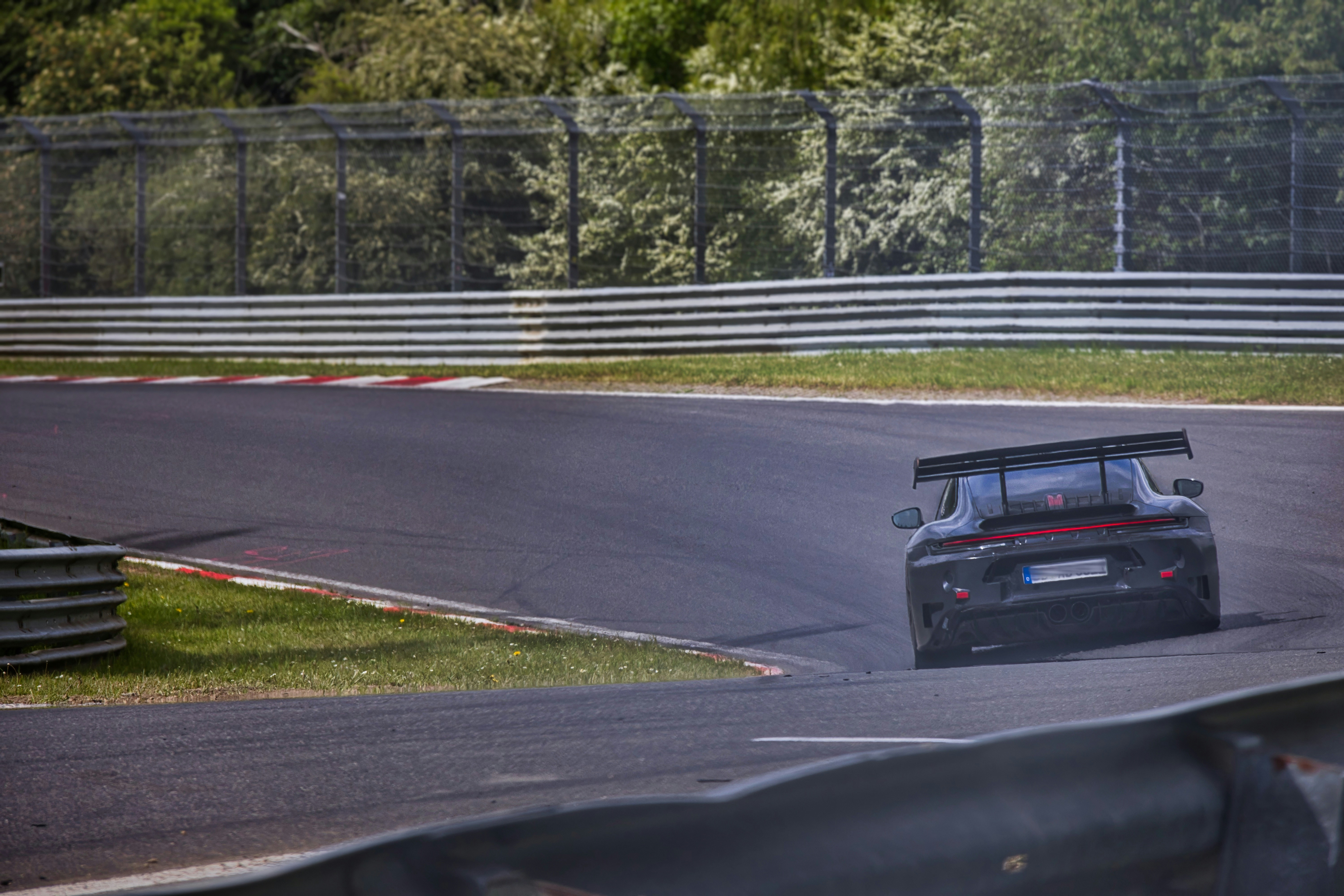 Rear-Buttress Racer: A Turbocharged Run on the Curved Track